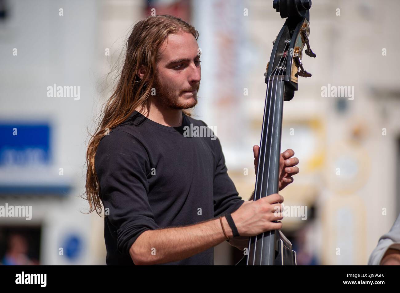 Street busker with a double bass Stock Photo - Alamy