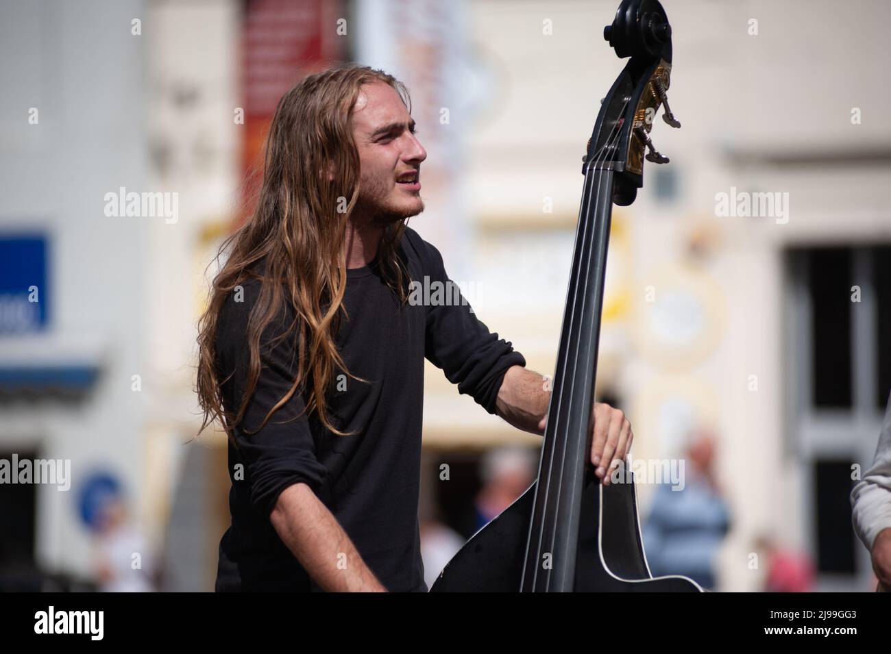 Street busker with a double bass Stock Photo - Alamy