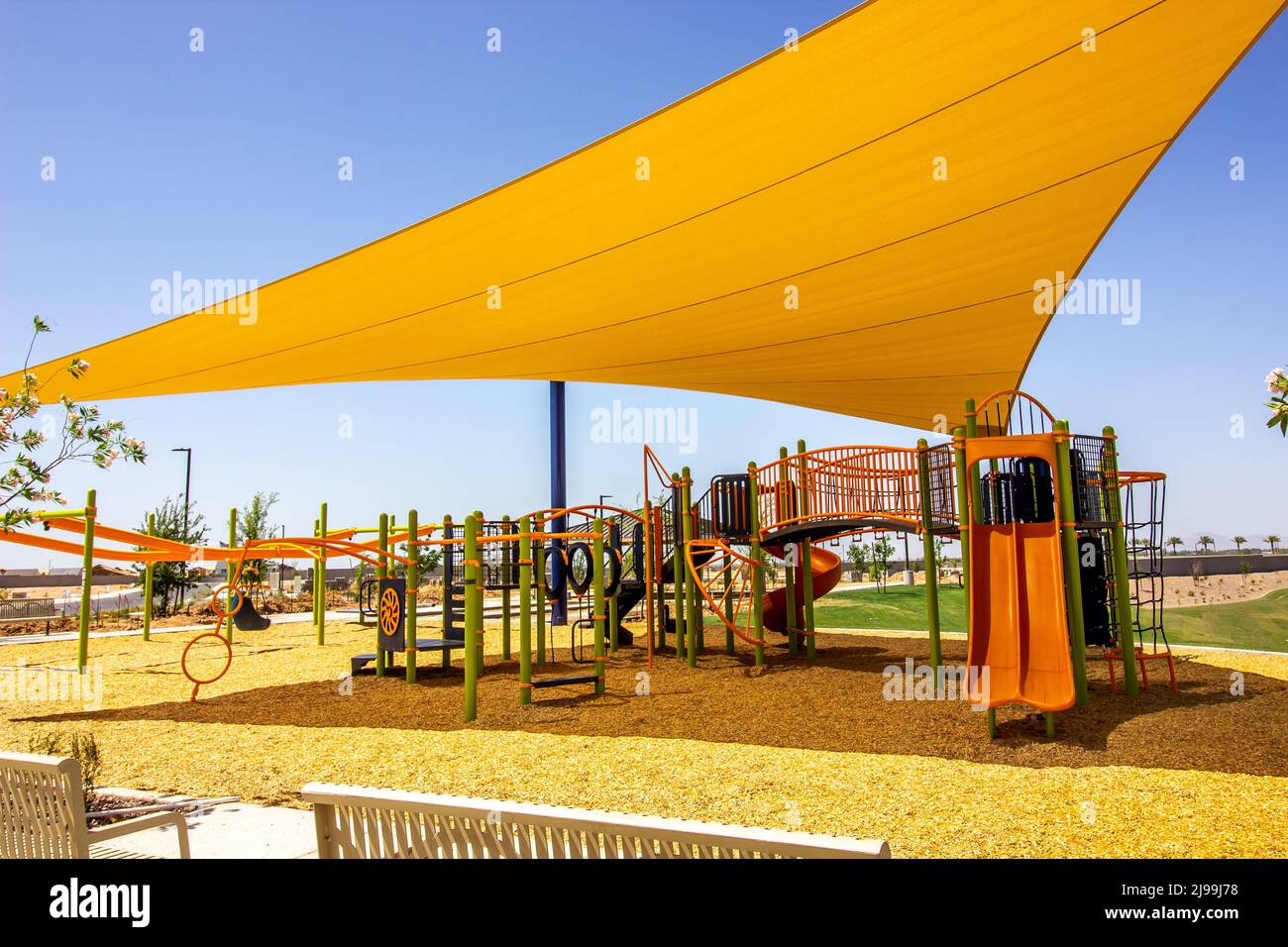 Children's Playground Equipment Under Shade Canopy Stock Photo - Alamy