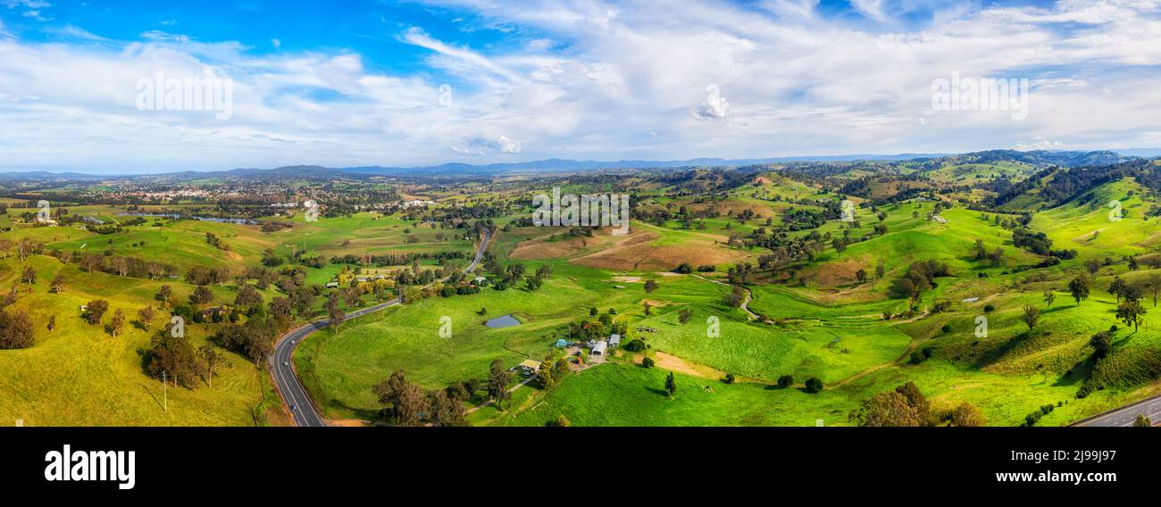 Lush green pastures in wide aerial panorama of Bega Valley meadows on ...