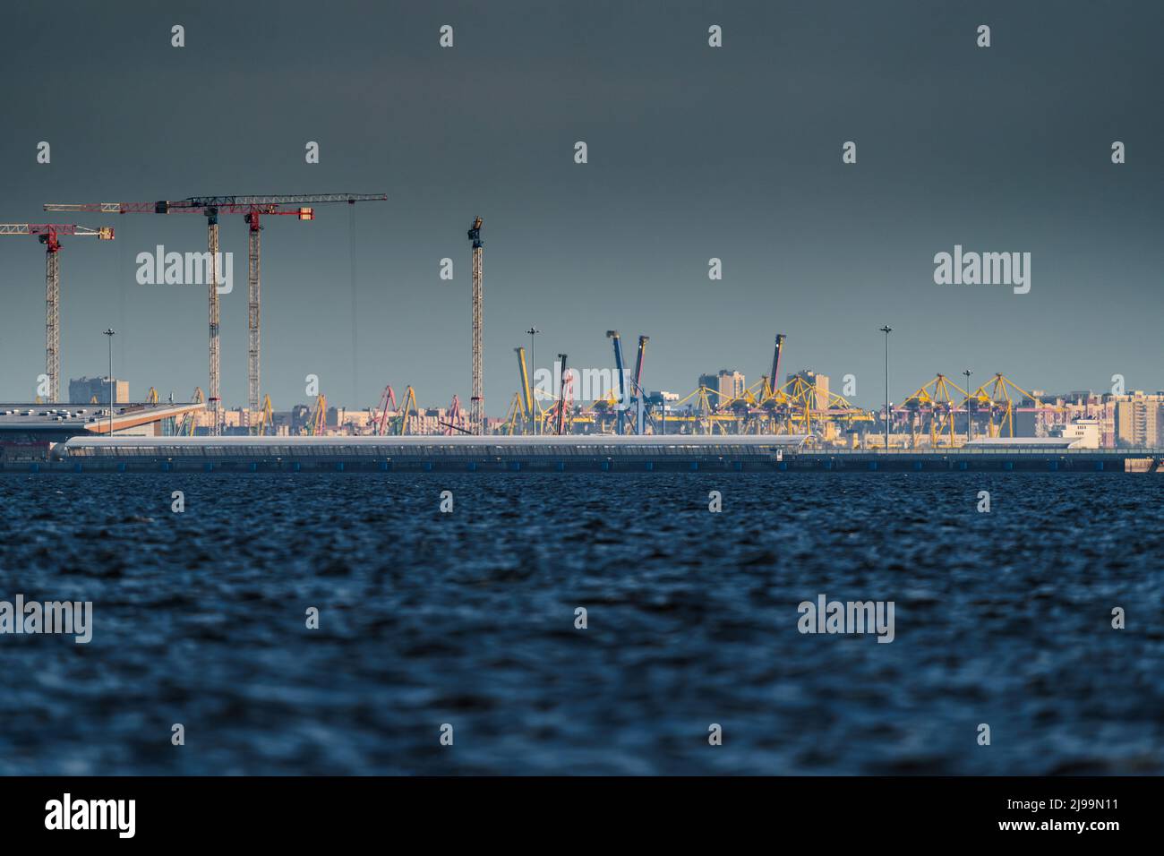 Seaport, construction cranes and cranes of the cargo port on the sea ...