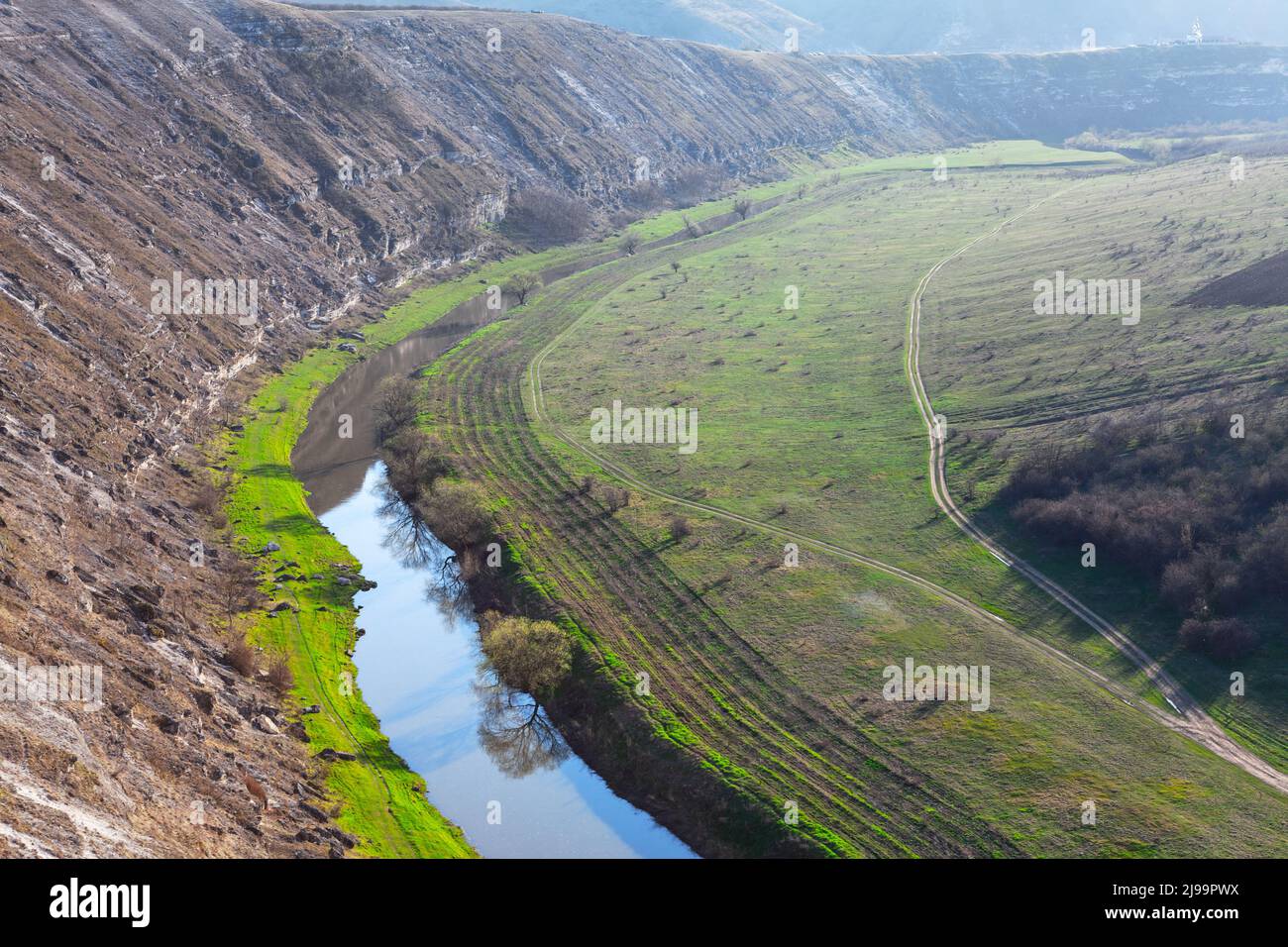 Aerial view of nature, green valley with river Stock Photo - Alamy