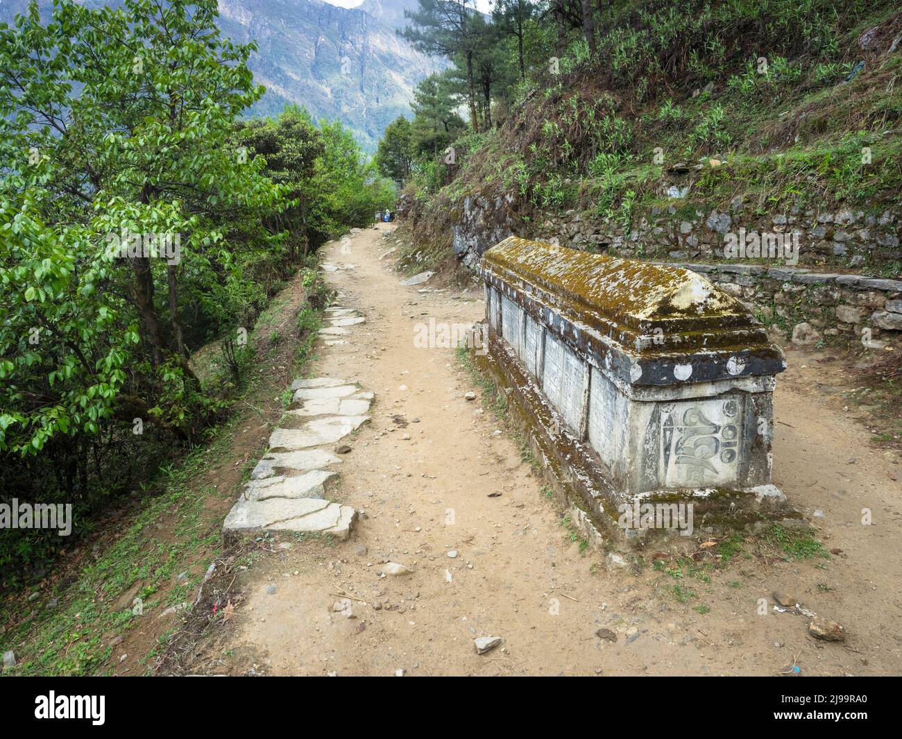 Mani wall on the trekking route to Namche Bazaar outside of Lukla ...