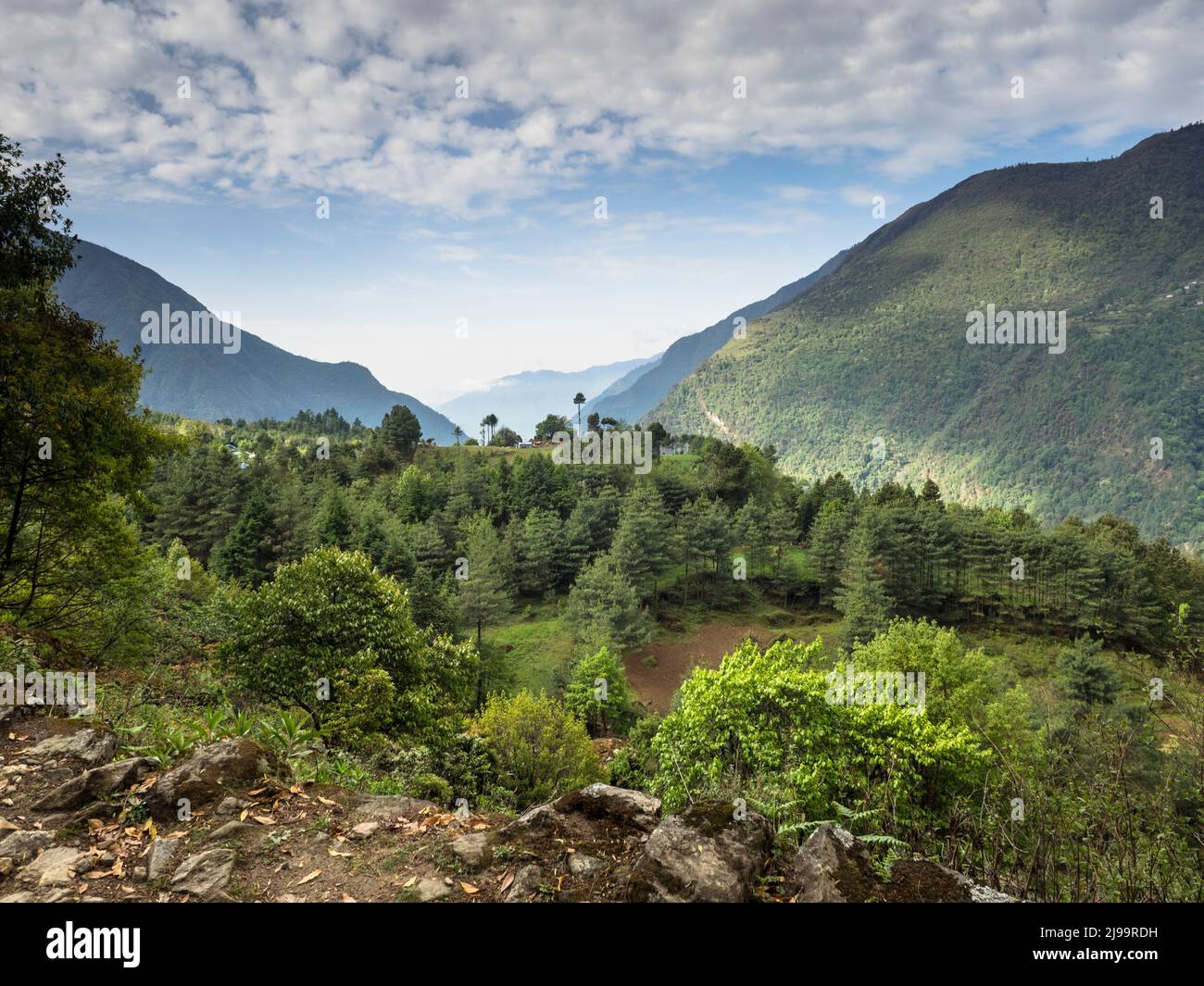 Looking down valley across fields, Lukla Stock Photo - Alamy