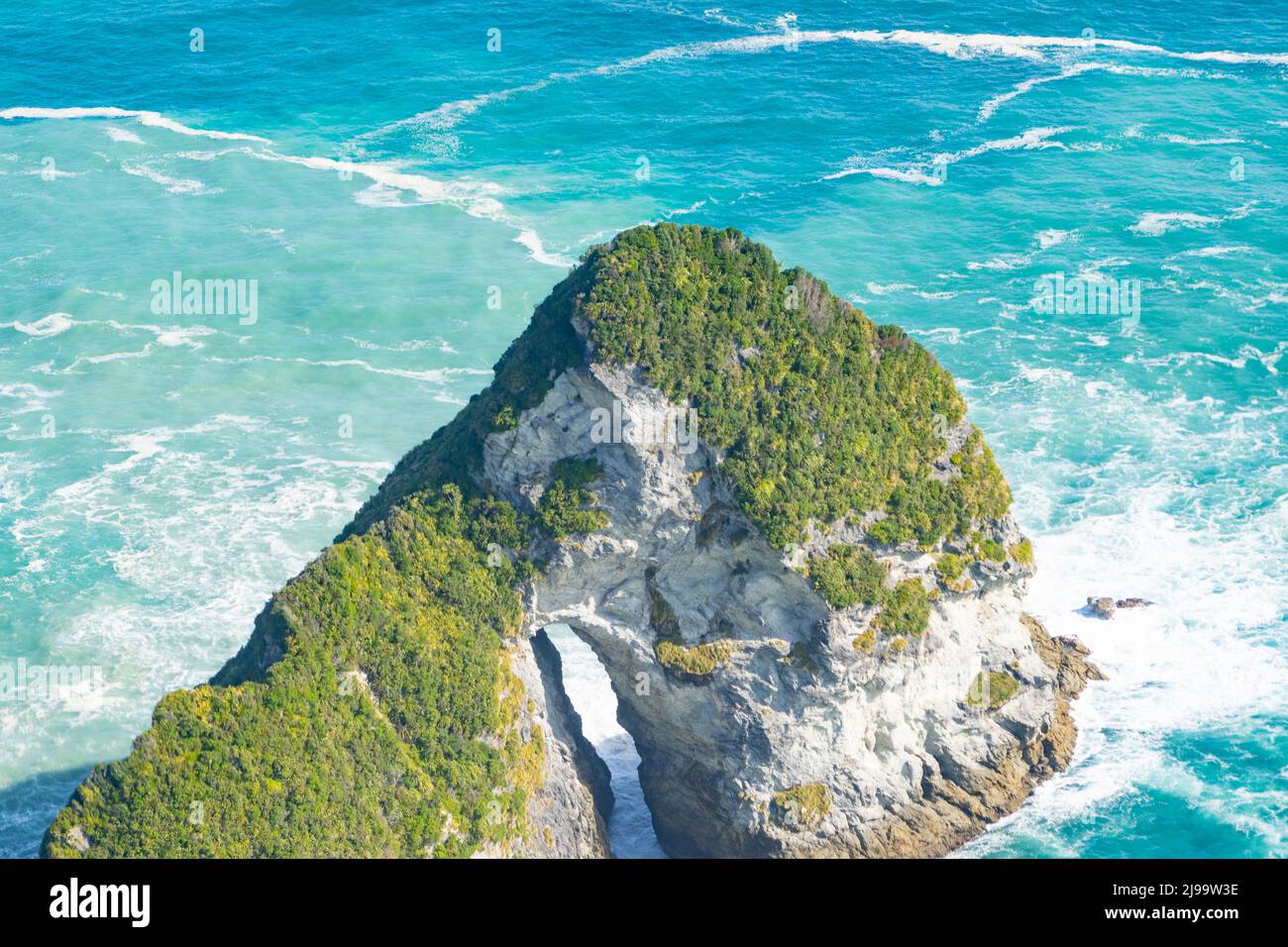 Aerial view coastal Fiordland South Island New Zealand. off-shore rock ...