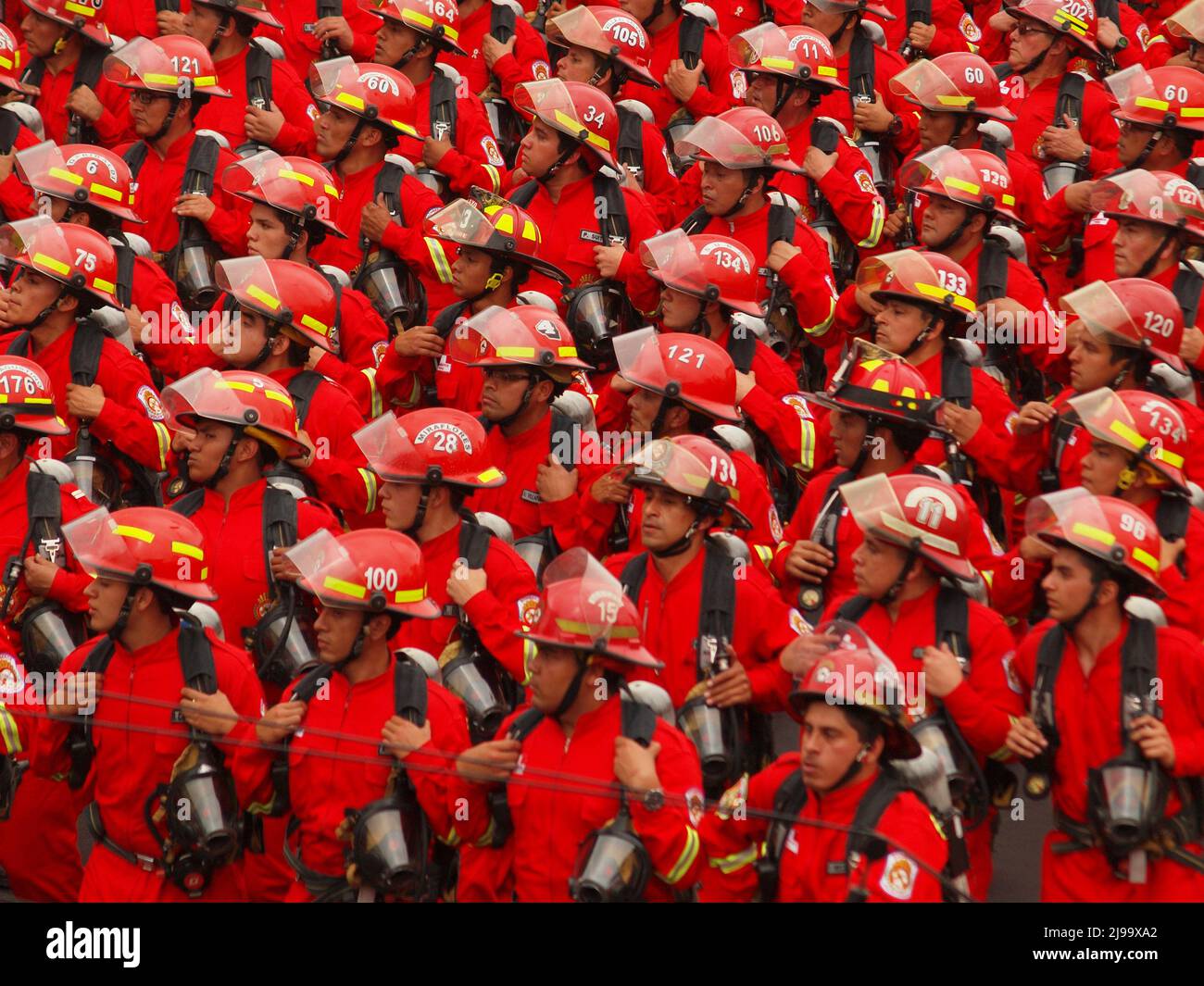 Battalion of volunteer firefighters marching in the parade for national ...