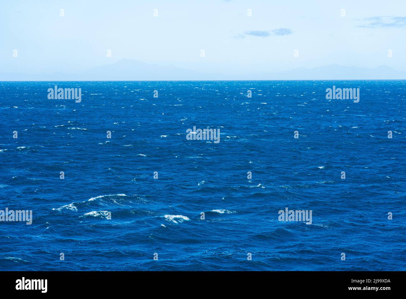 Sea surface on windy day with white caps and splashing background Stock ...