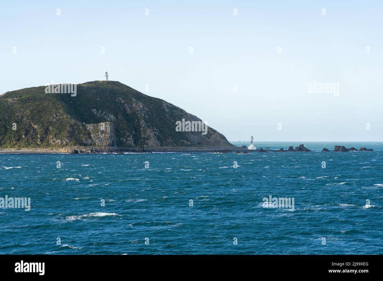 Pencarrow Heads lighthouses and coastal scene when leaving Wellington ...