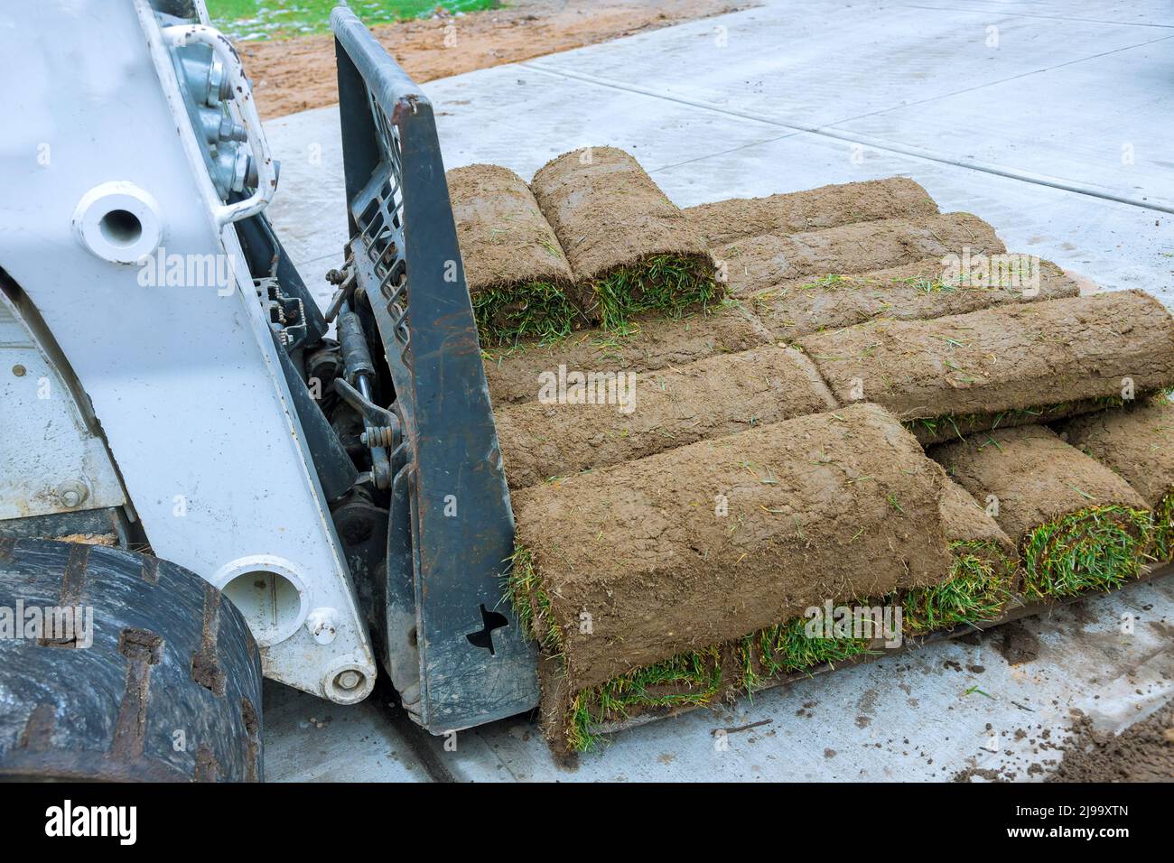 Stack of turf grass rolls for a lawn fresh grass to decorate landscape ...