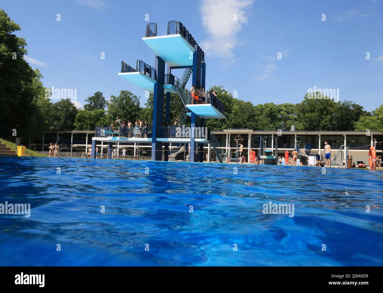 Cologne, Germany. 18th May, 2022. A diving tower in an outdoor pool ...