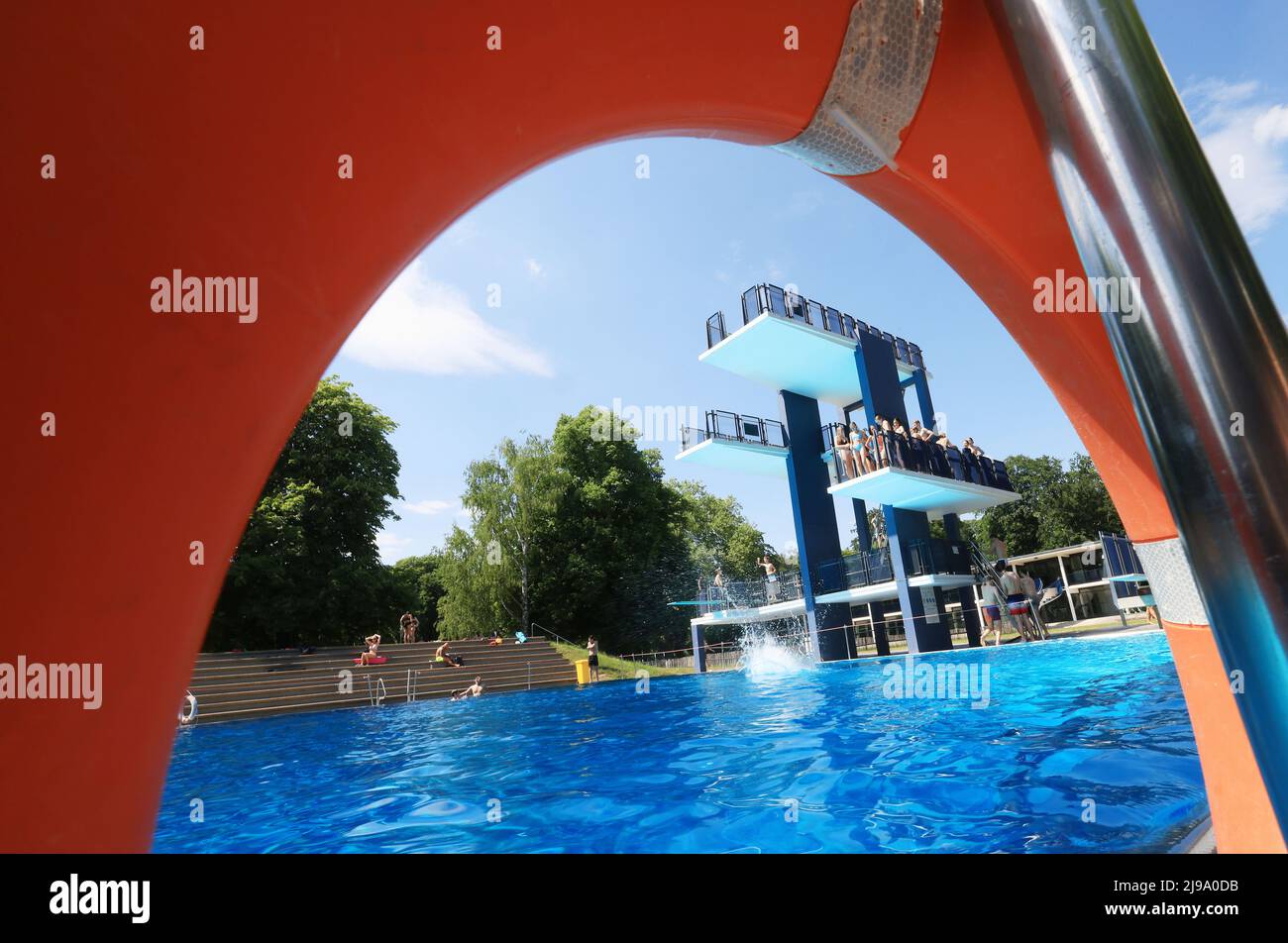 Cologne, Germany. 18th May, 2022. A diving tower in an outdoor pool ...