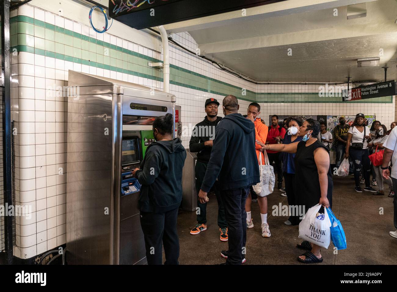 New York, NY - May 21, 2022: People seen in line to buy MTA issued ...