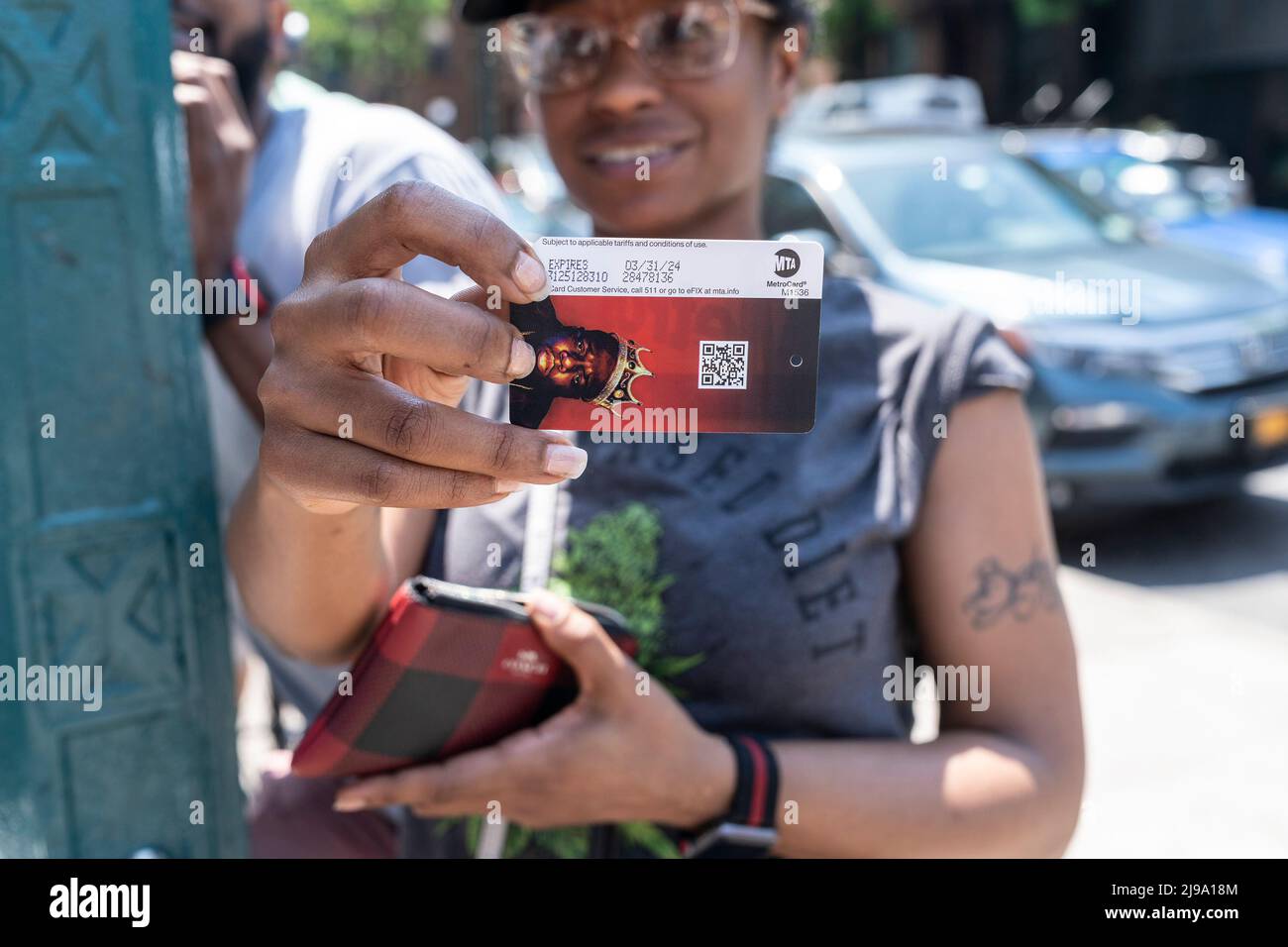 New York, USA. 21st May, 2022. A person proudly displayed MTA issued ...