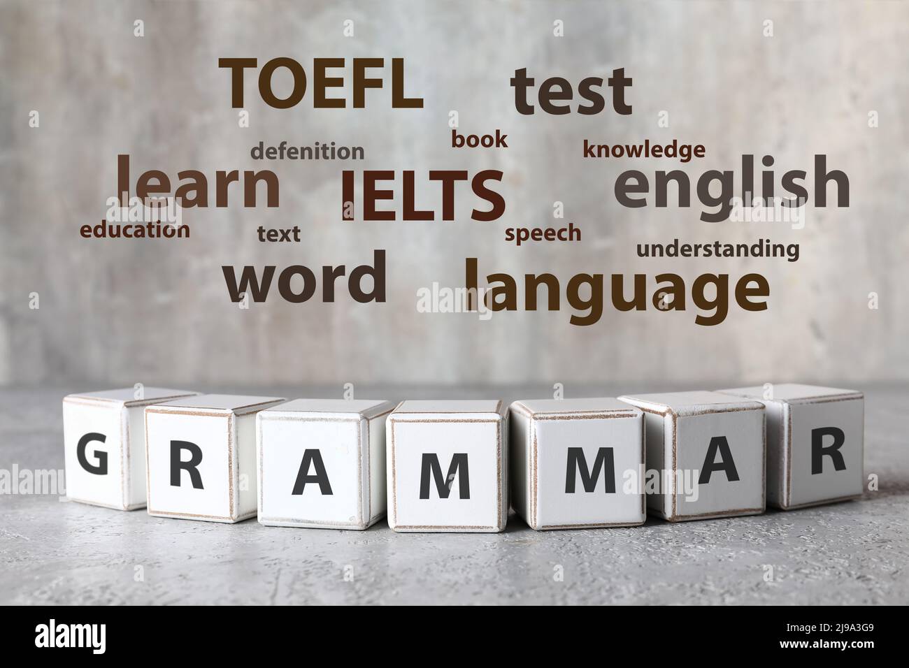 Text GRAMMAR made of cubes and different words on light background ...