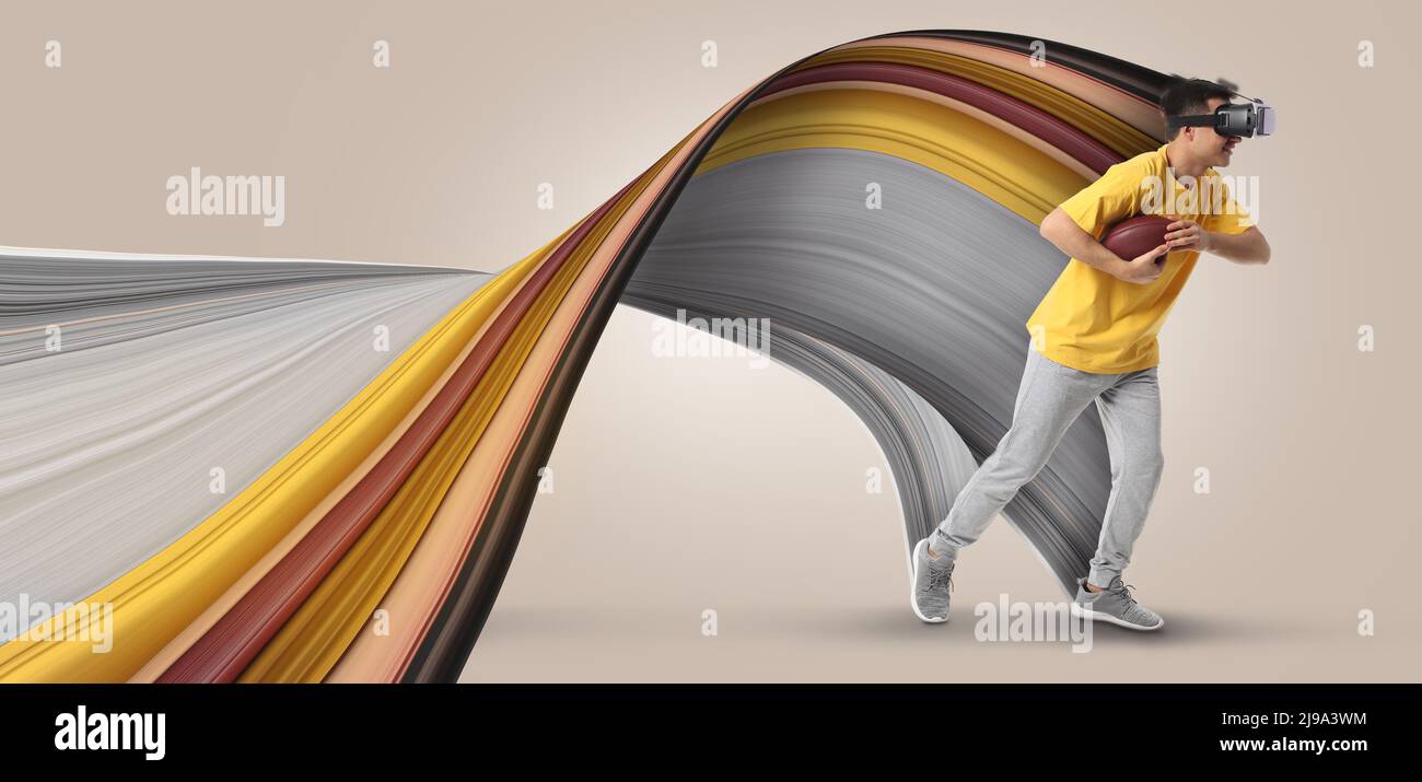 Sporty young man with virtual reality glasses and rugby ball training ...