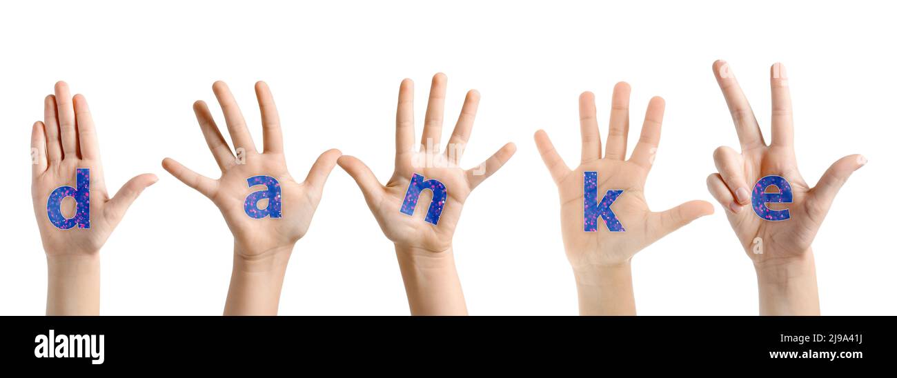 Child's hands with letters making word DANKE (German for Thank you) on ...