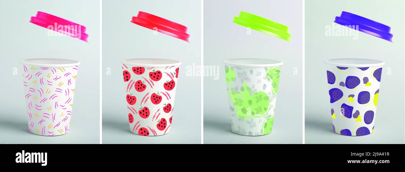 Set of creative paper cups on light background Stock Photo - Alamy