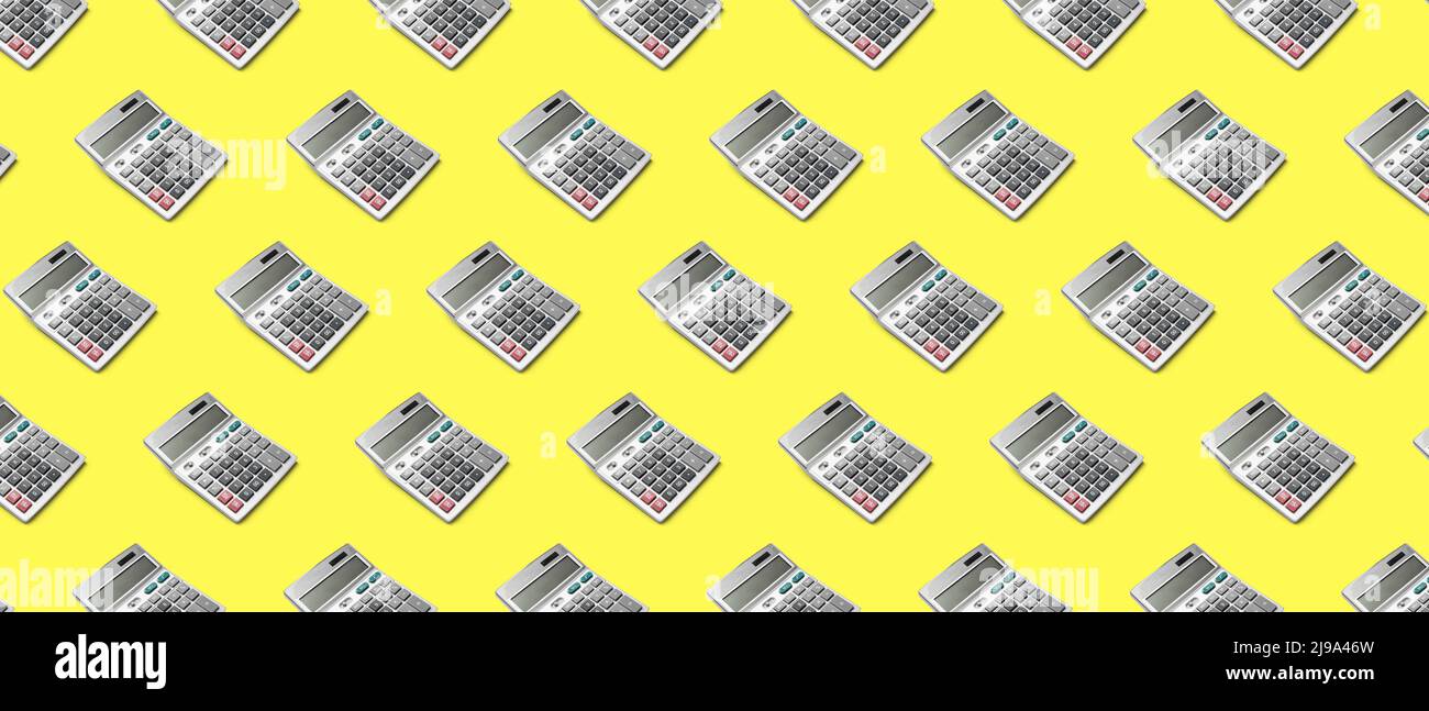 Many calculators on yellow background. Pattern for design Stock Photo ...