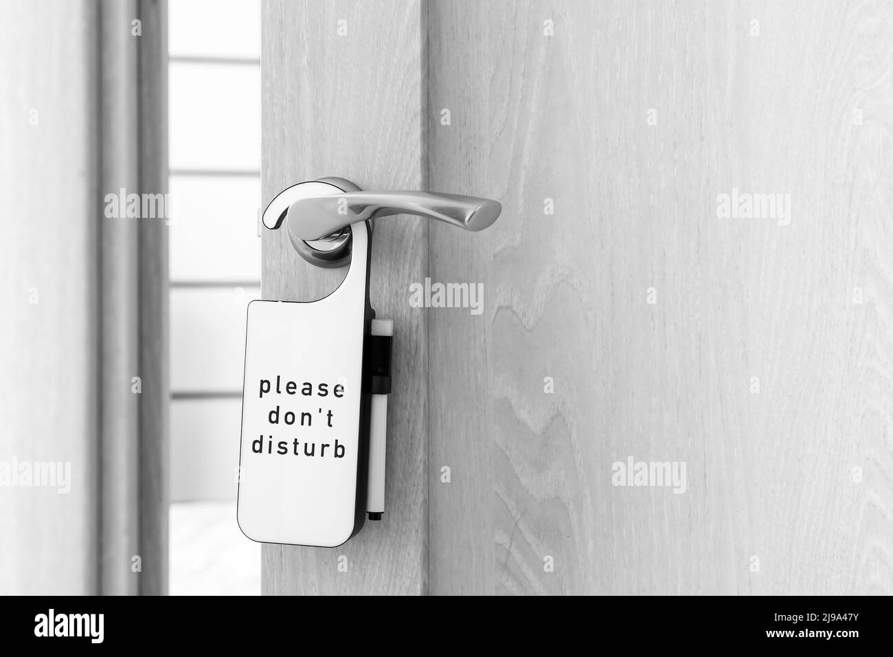 DO NOT DISTURB sign on door of hotel room, closeup Stock Photo - Alamy