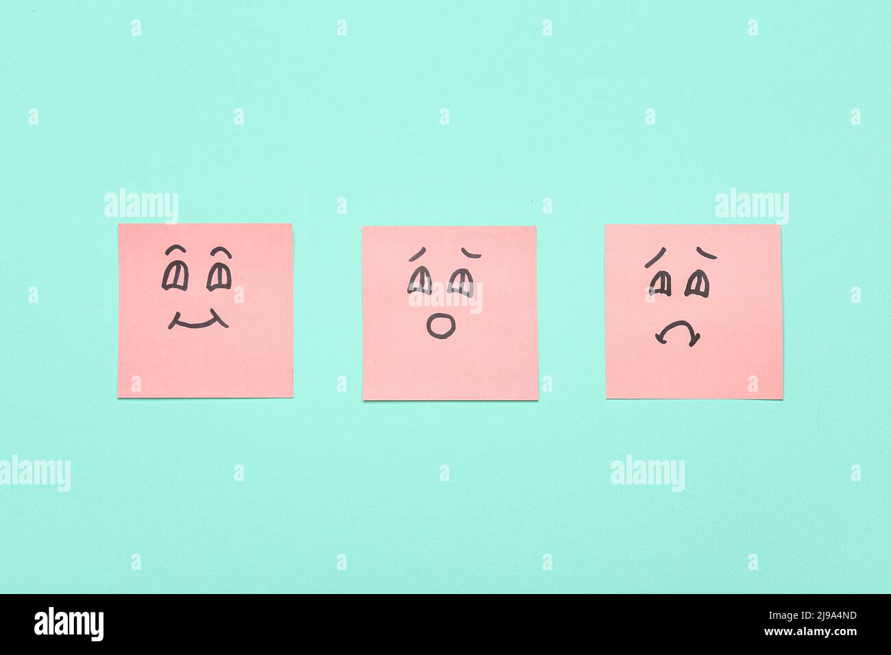 Sticky notes with different smile drawings on color background Stock ...