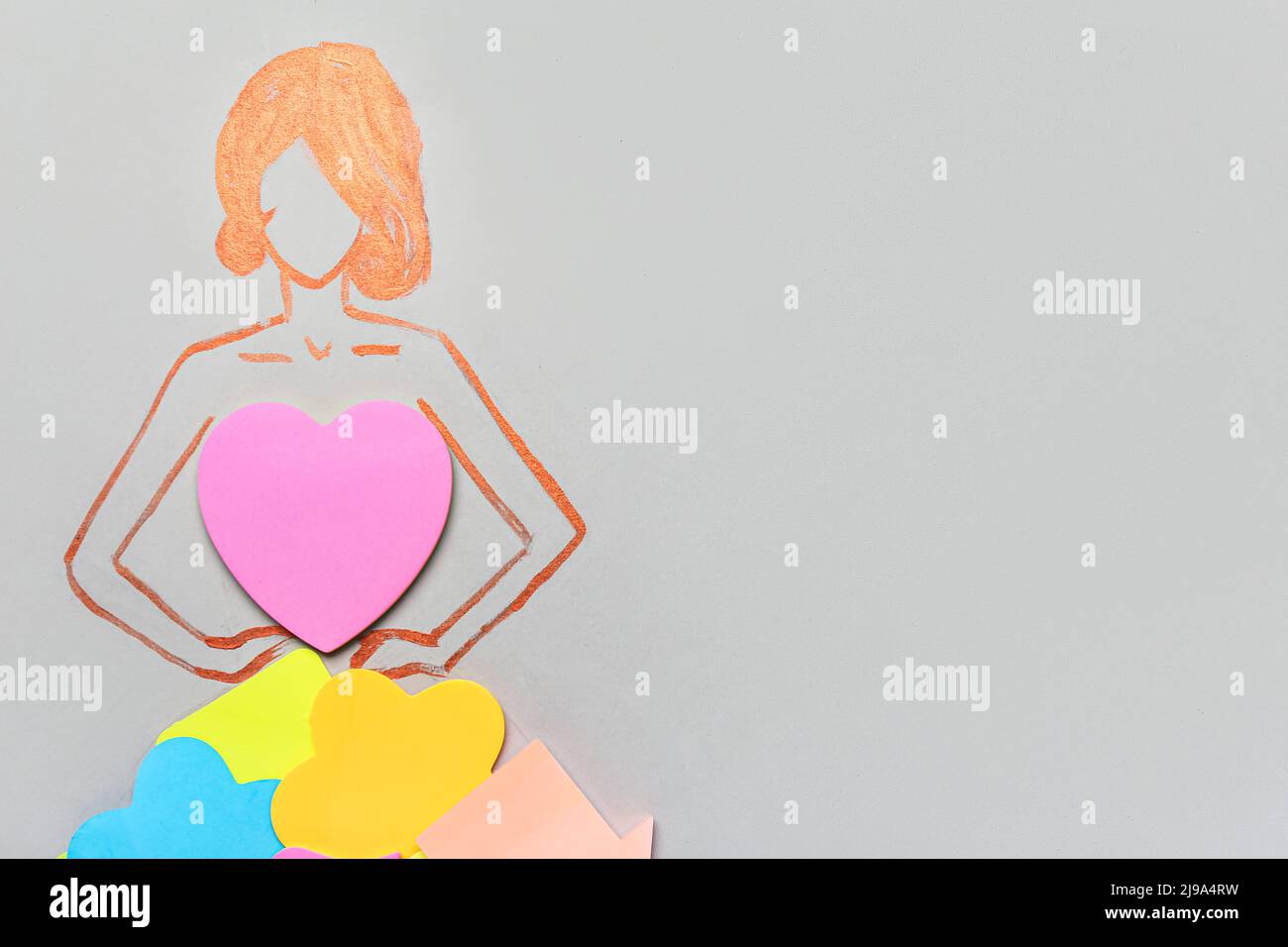 Silhouette of woman with dress made of sticky notes on grey background ...