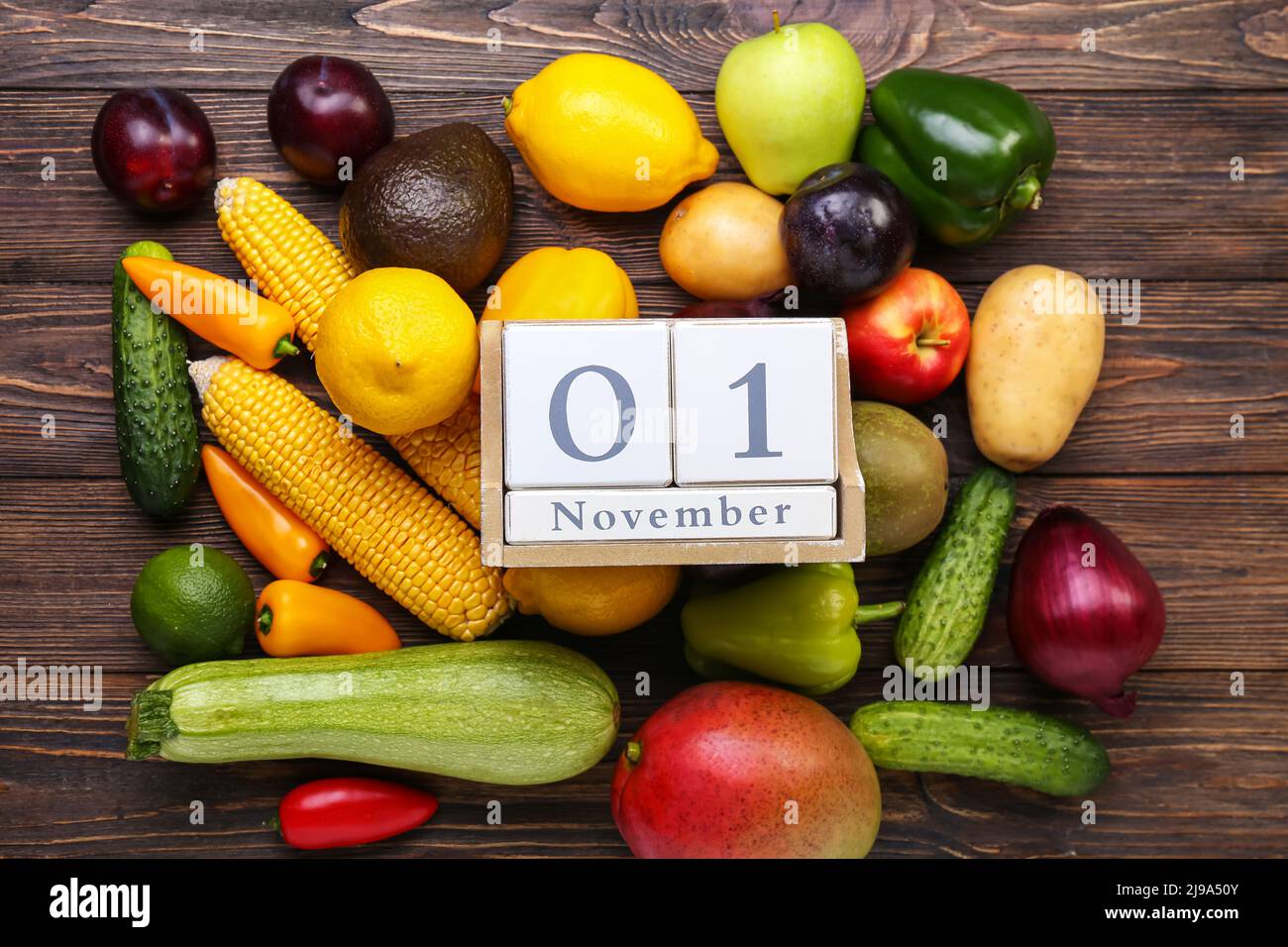 Different fresh fruits, vegetables and cube calendar with date NOVEMBER ...