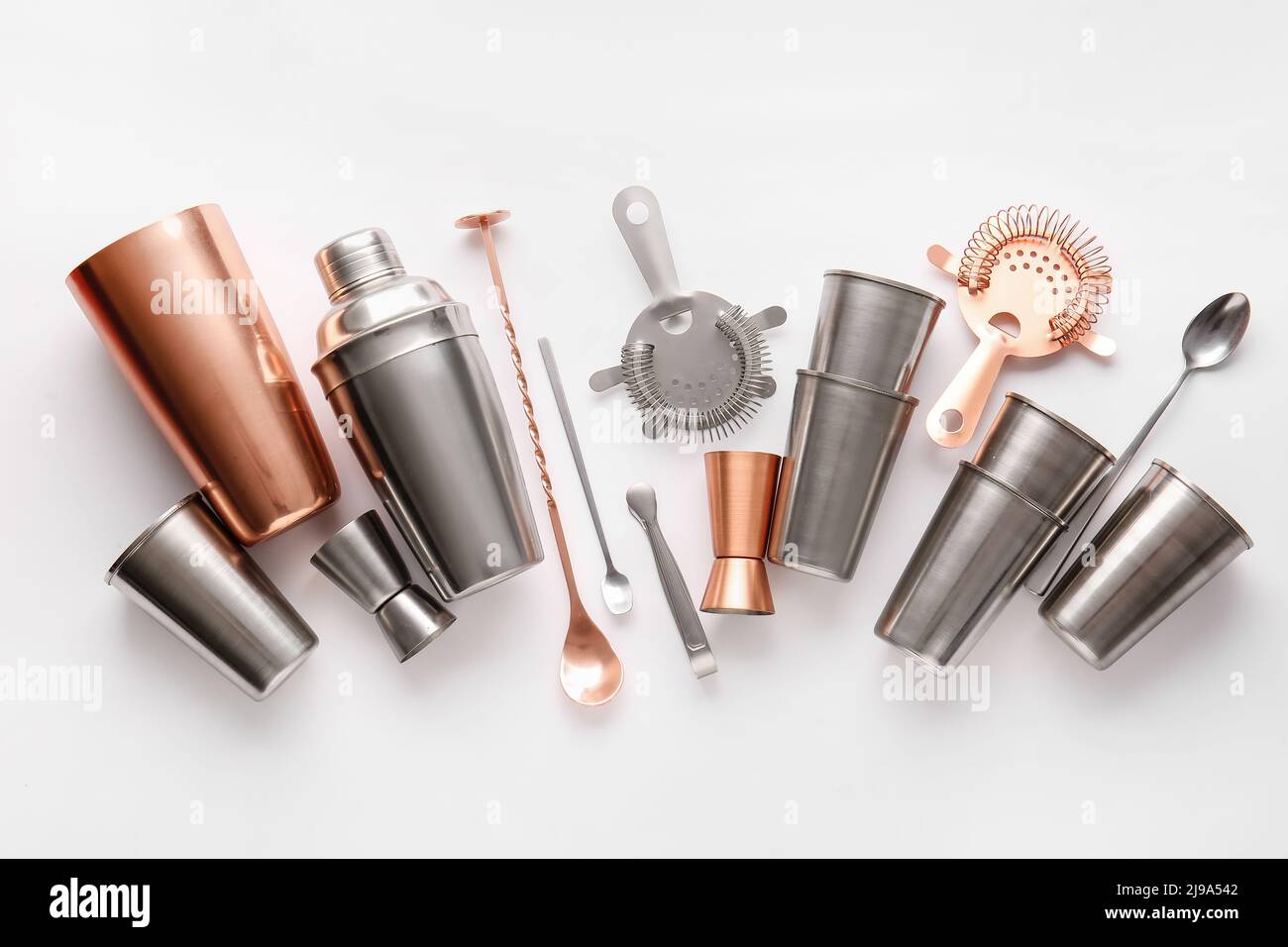 Set of cocktail utensils on white background Stock Photo - Alamy