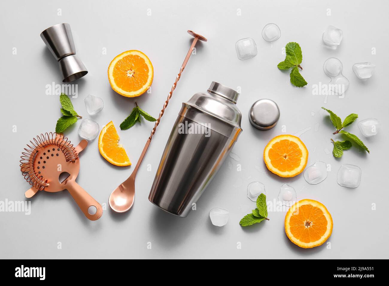 Different cocktail utensils and ingredients on grey background Stock ...