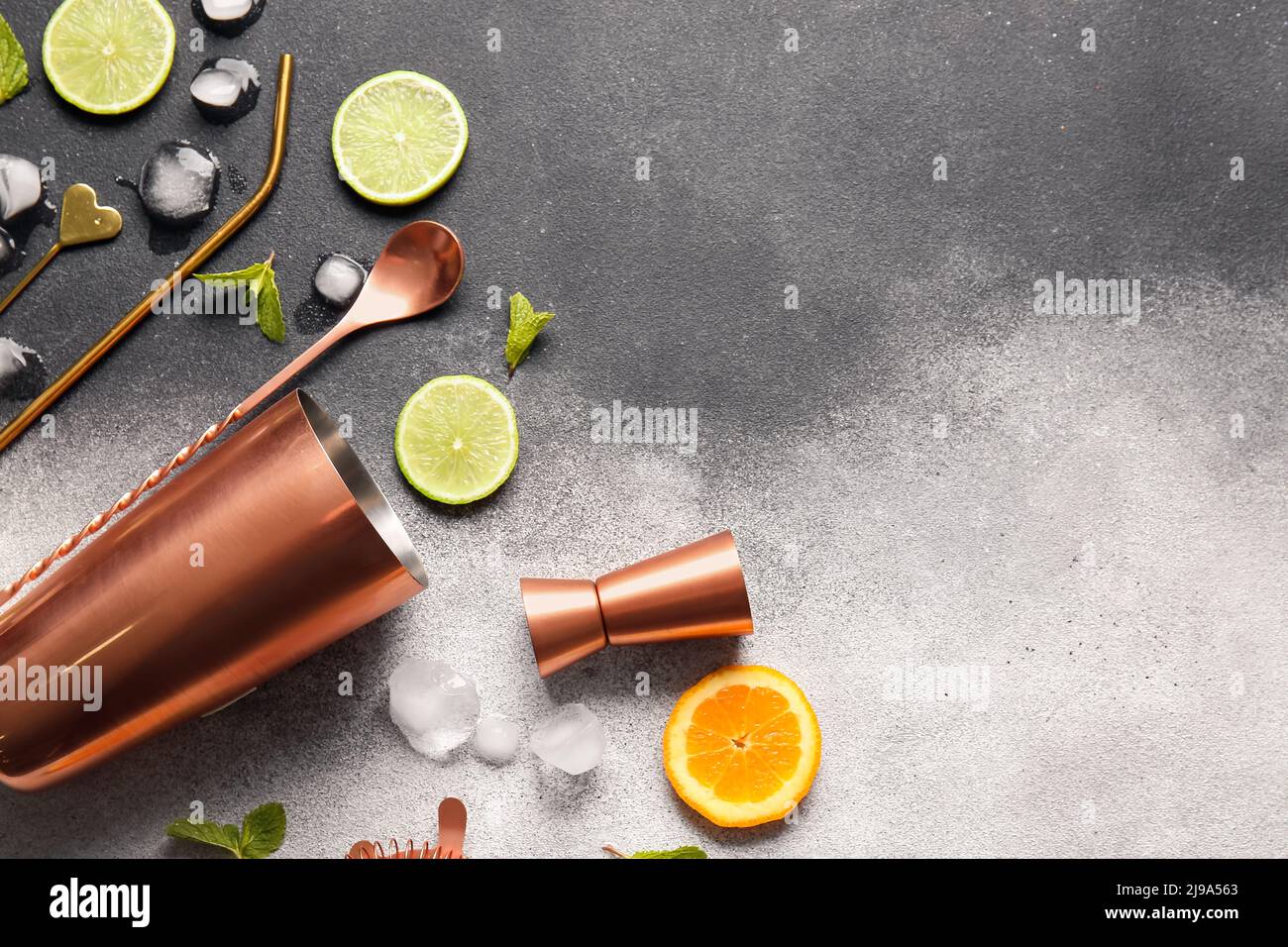 Different bartender tools and cocktail ingredients on black and white ...