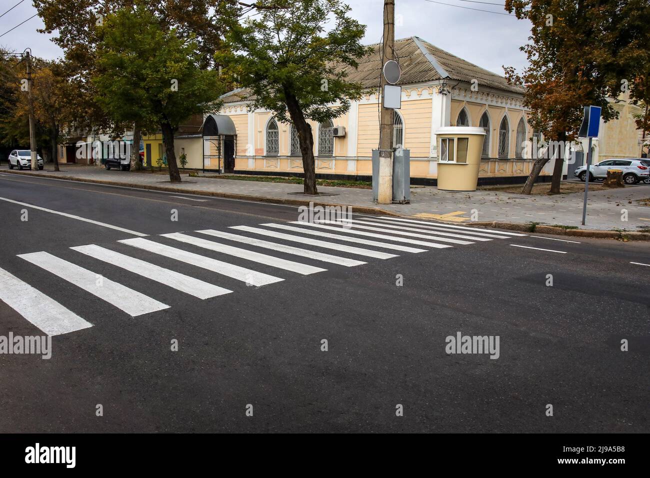City street with zebra crossing on road Stock Photo - Alamy