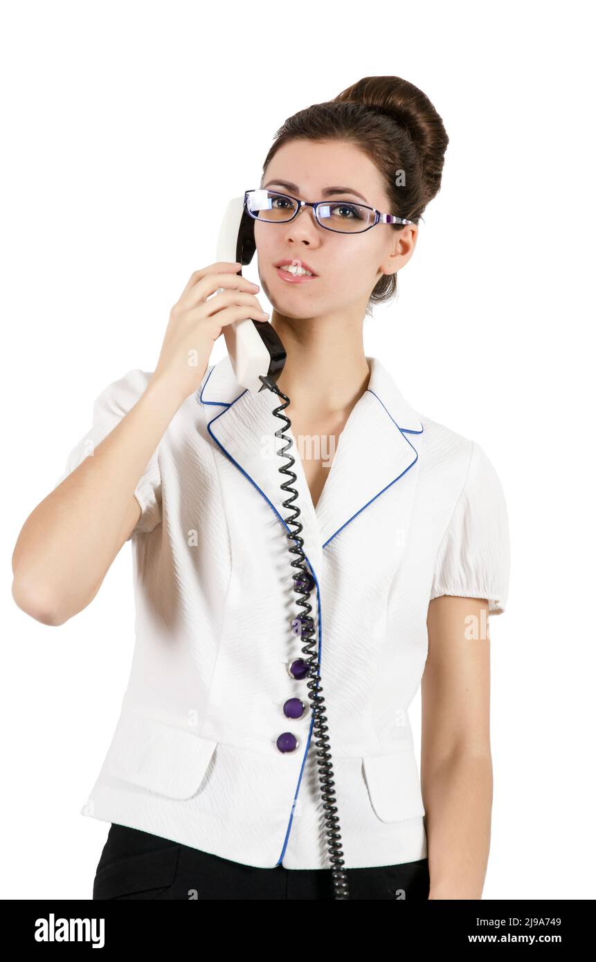 Young woman secretary talking on the phone. Isolated on white Stock ...