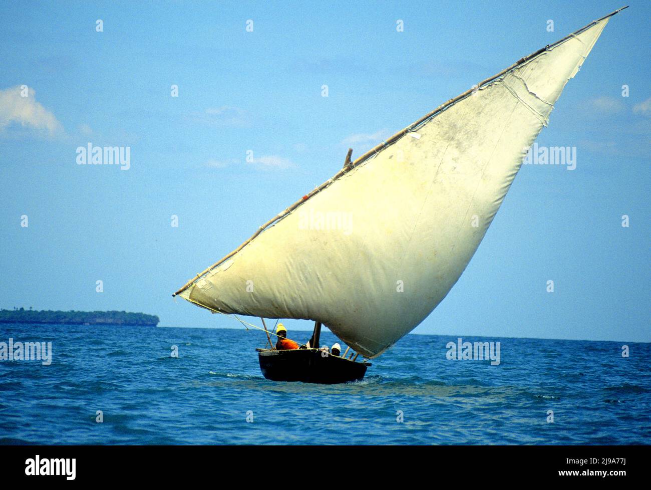 A lateen sail fishing boat off Chumbe Island, Indian Ocean, Tanzania ...