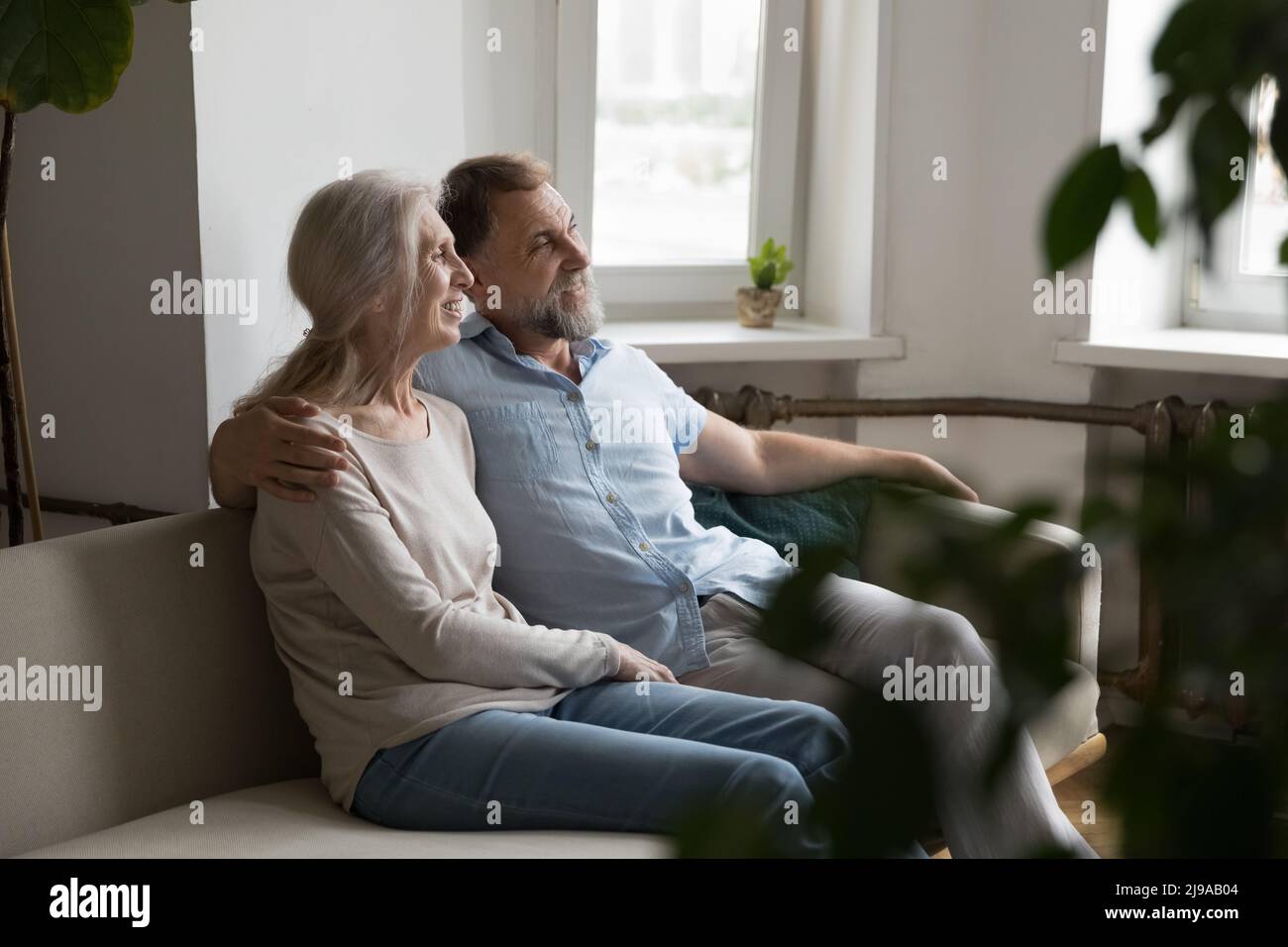 Portrait mature woman resting couch home hi-res stock photography and ...