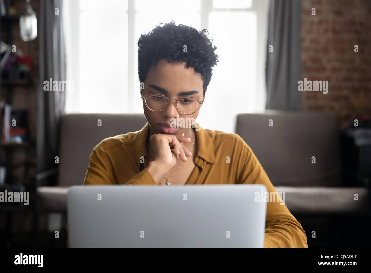 Person staring at computer screen hi-res stock photography and images ...