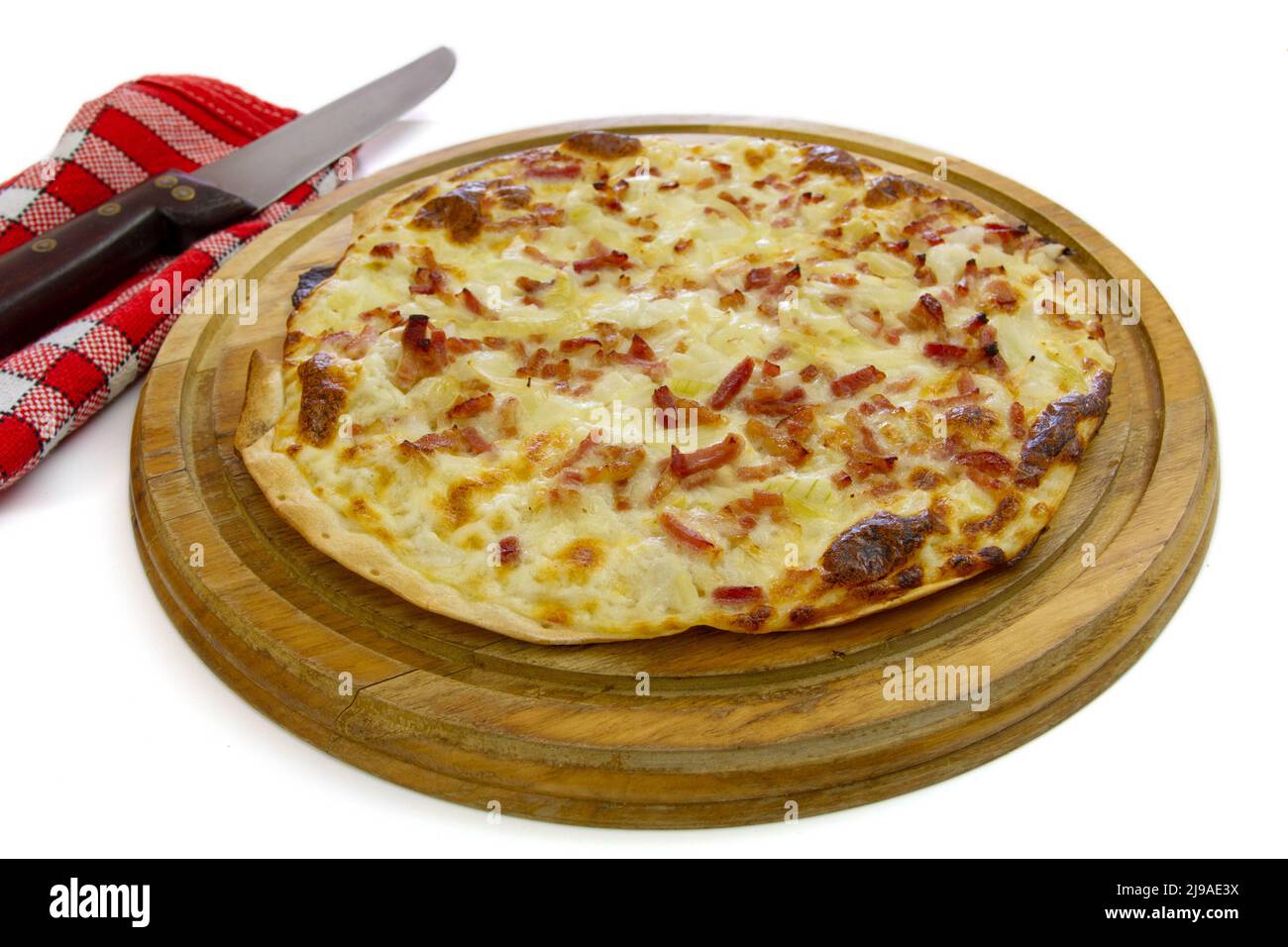 flammekueche (flamed pie), Alsatian specialty, isolated on white ...