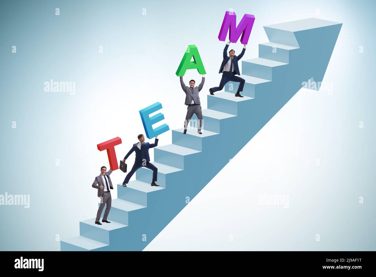 Teamwork concept with the people carrying team letters Stock Photo - Alamy