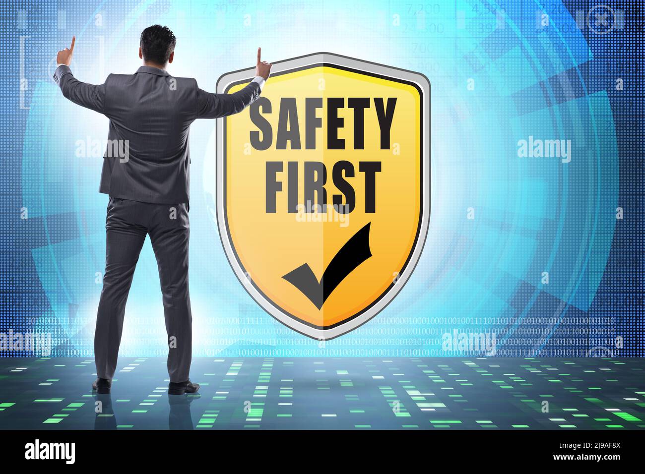 Safety first concept with the businessman Stock Photo - Alamy