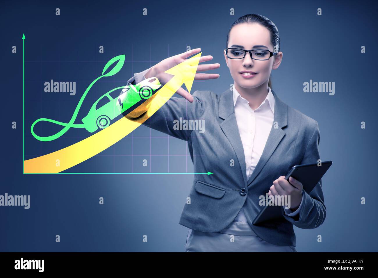 Electric car concept with the businessoman pressing button Stock Photo ...