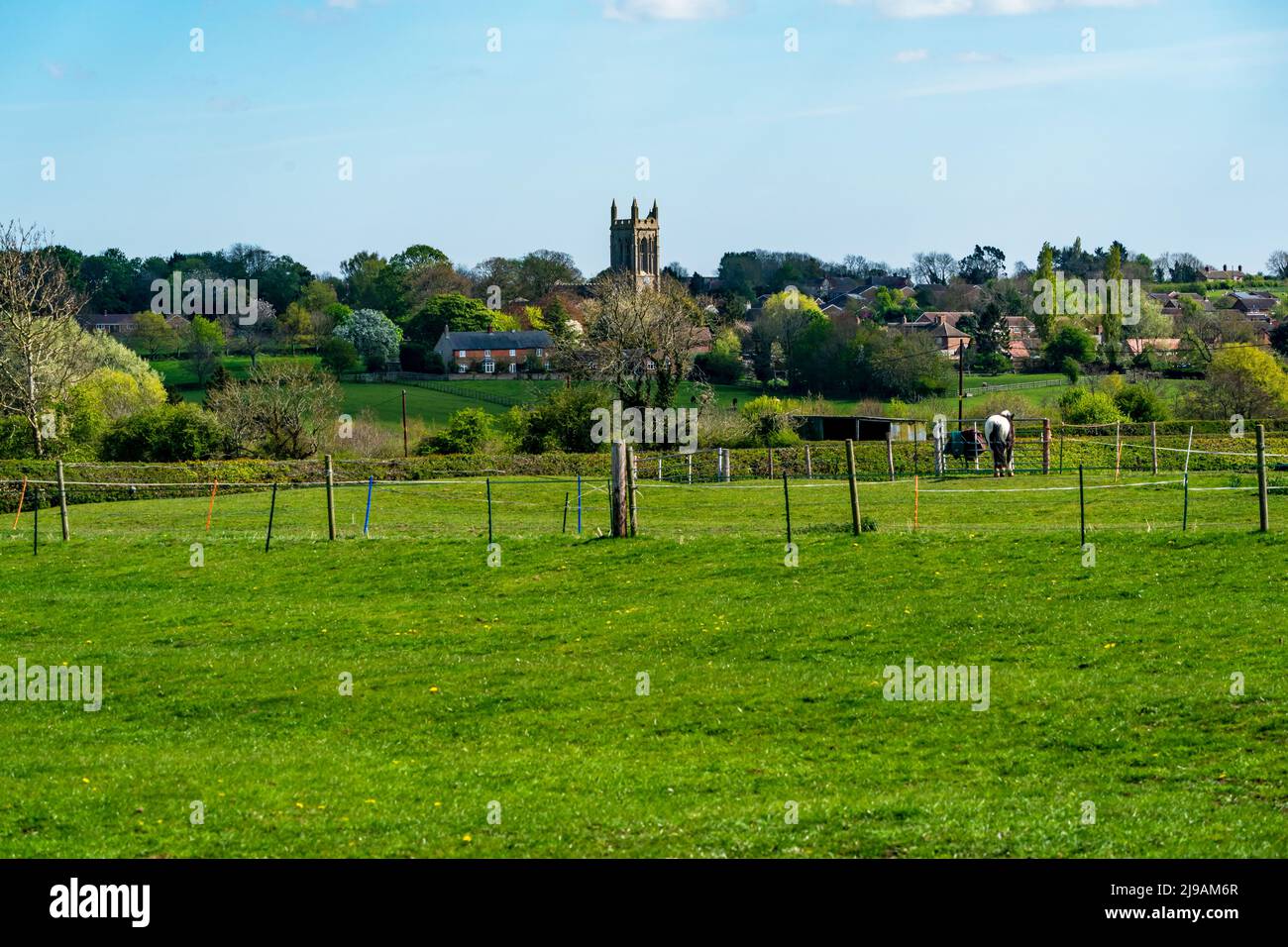English countryside with St Andrew's church in the distance in ...