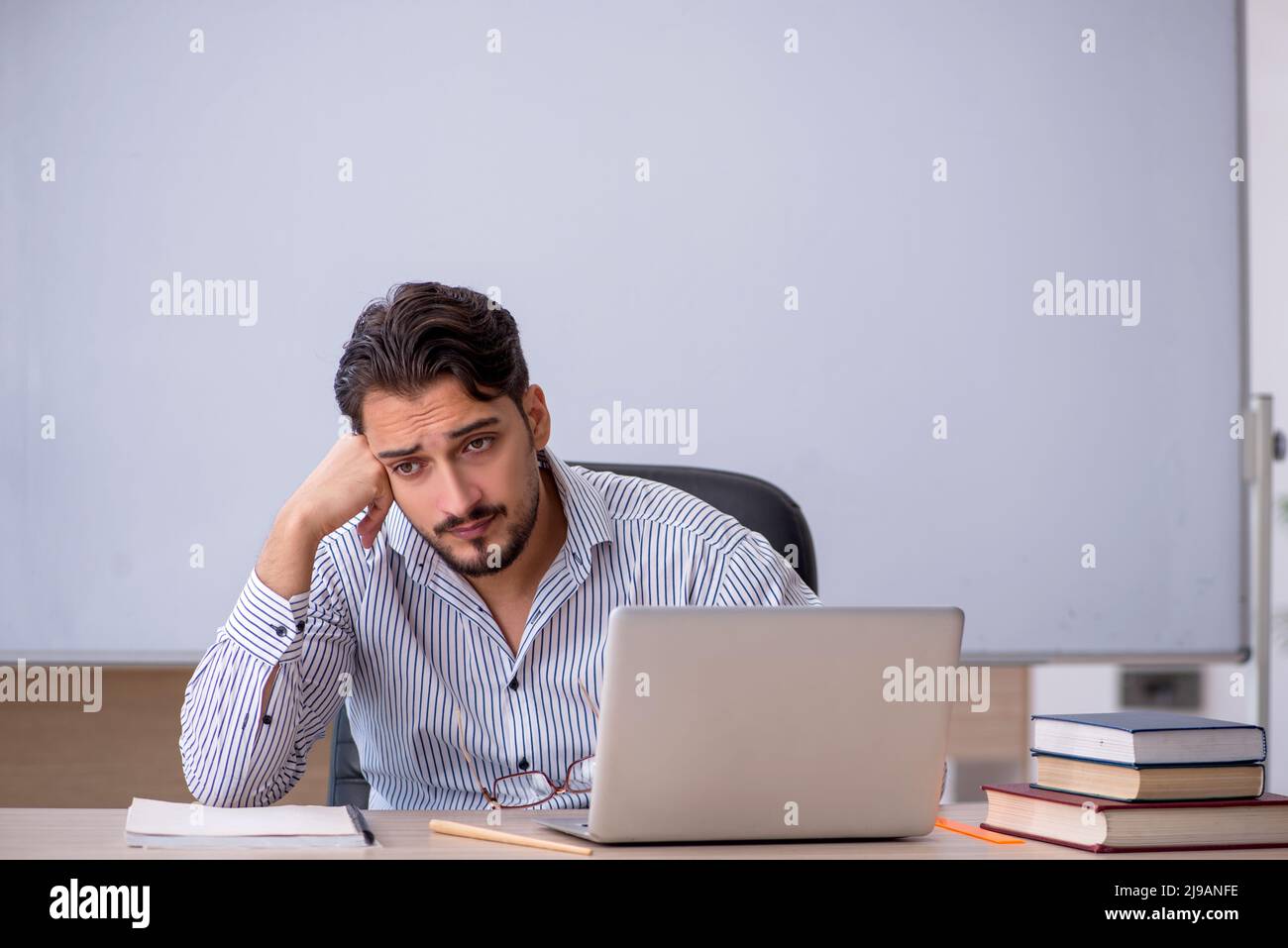 Upset teacher teaching hi-res stock photography and images - Alamy