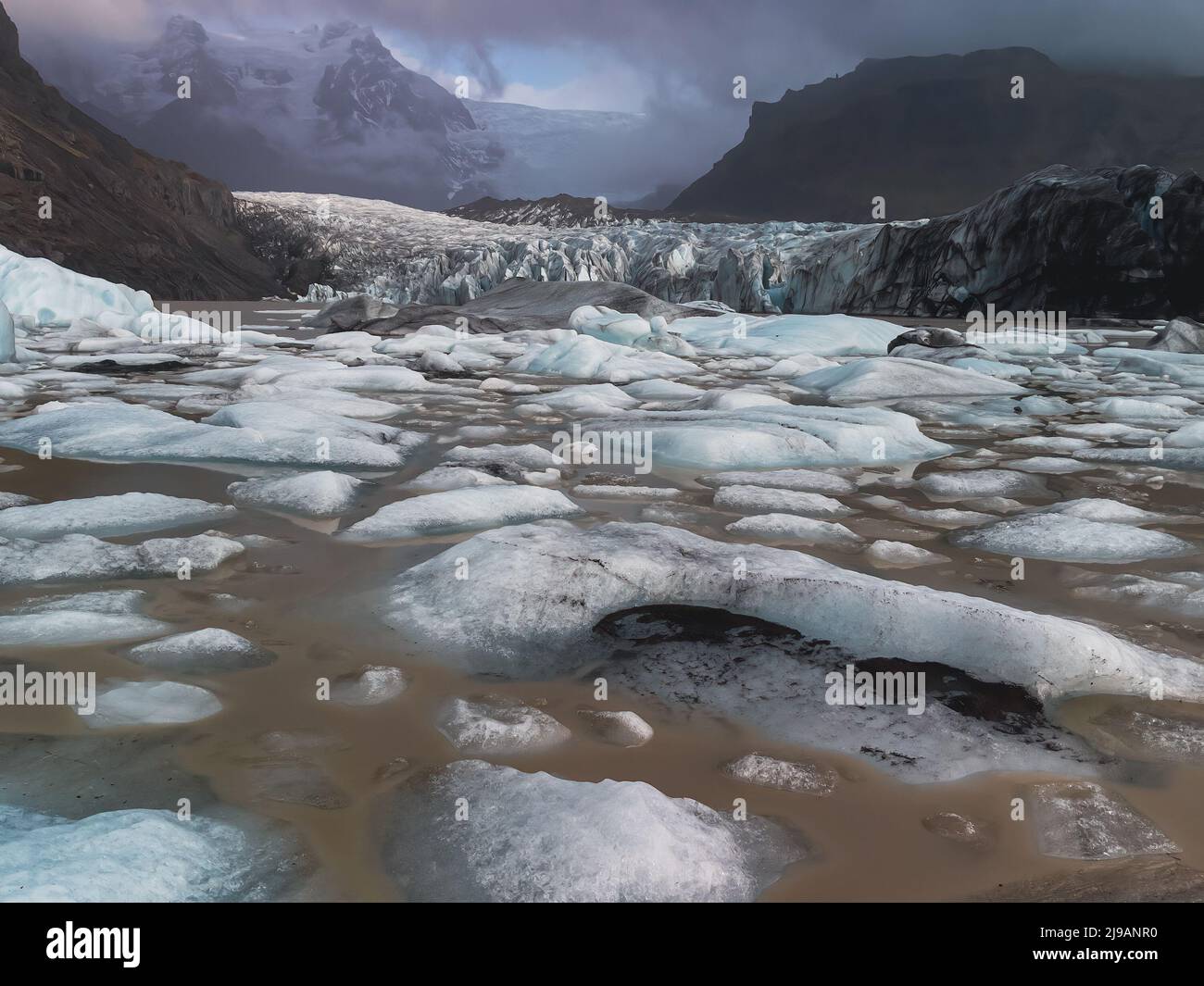 Massive glacier tongue end melt down with icebergs Stock Photo - Alamy