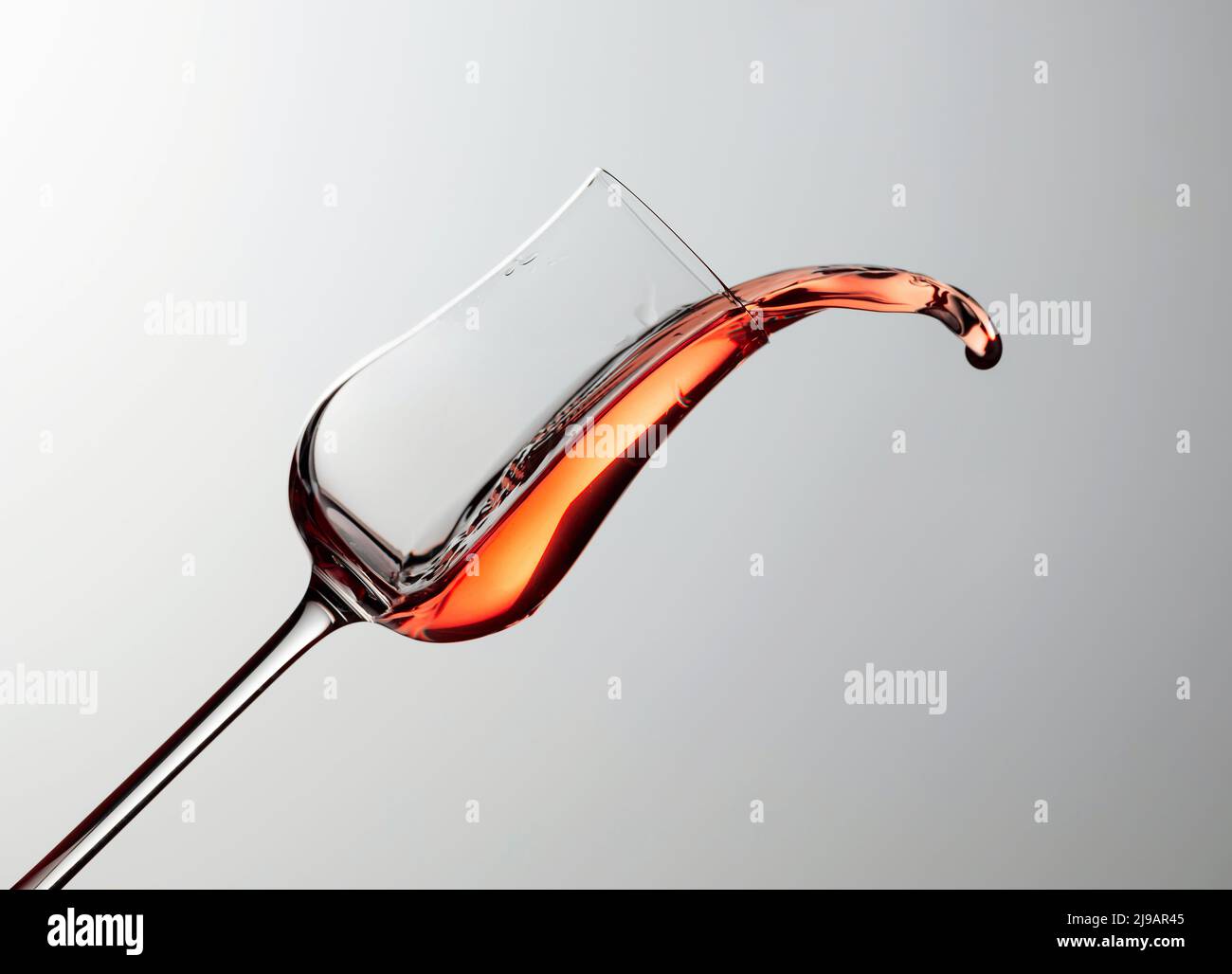 The drink spills out of the glass. Concept of the theme of premium ...