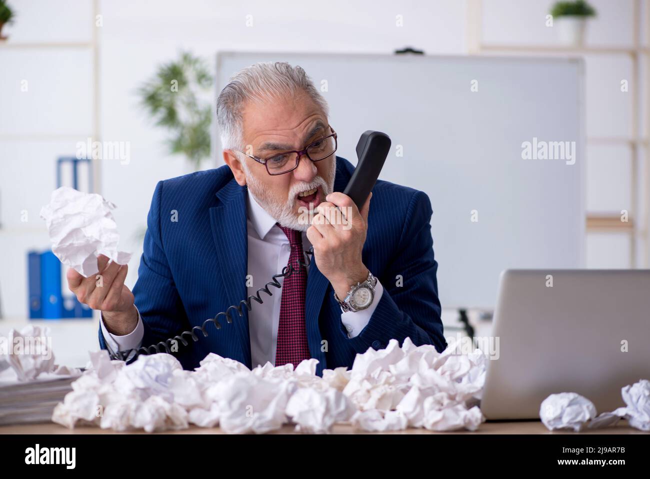Angry old businessman talking in hi-res stock photography and images ...