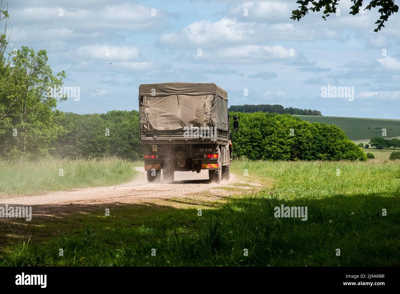 British Army MAN SV 4x4 logistics truck driving away from camera on a ...