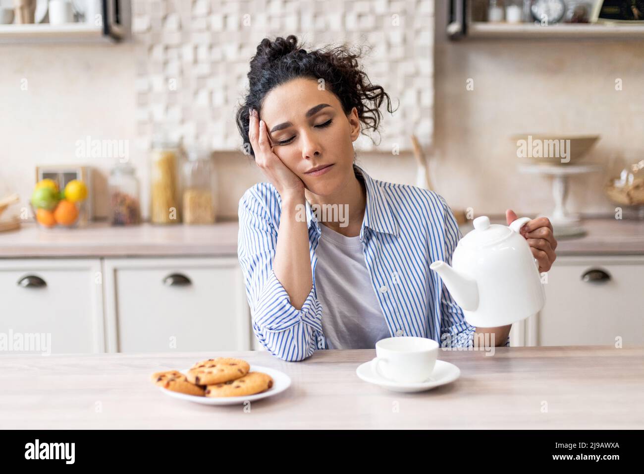 Young woman wakes up in hi-res stock photography and images - Alamy