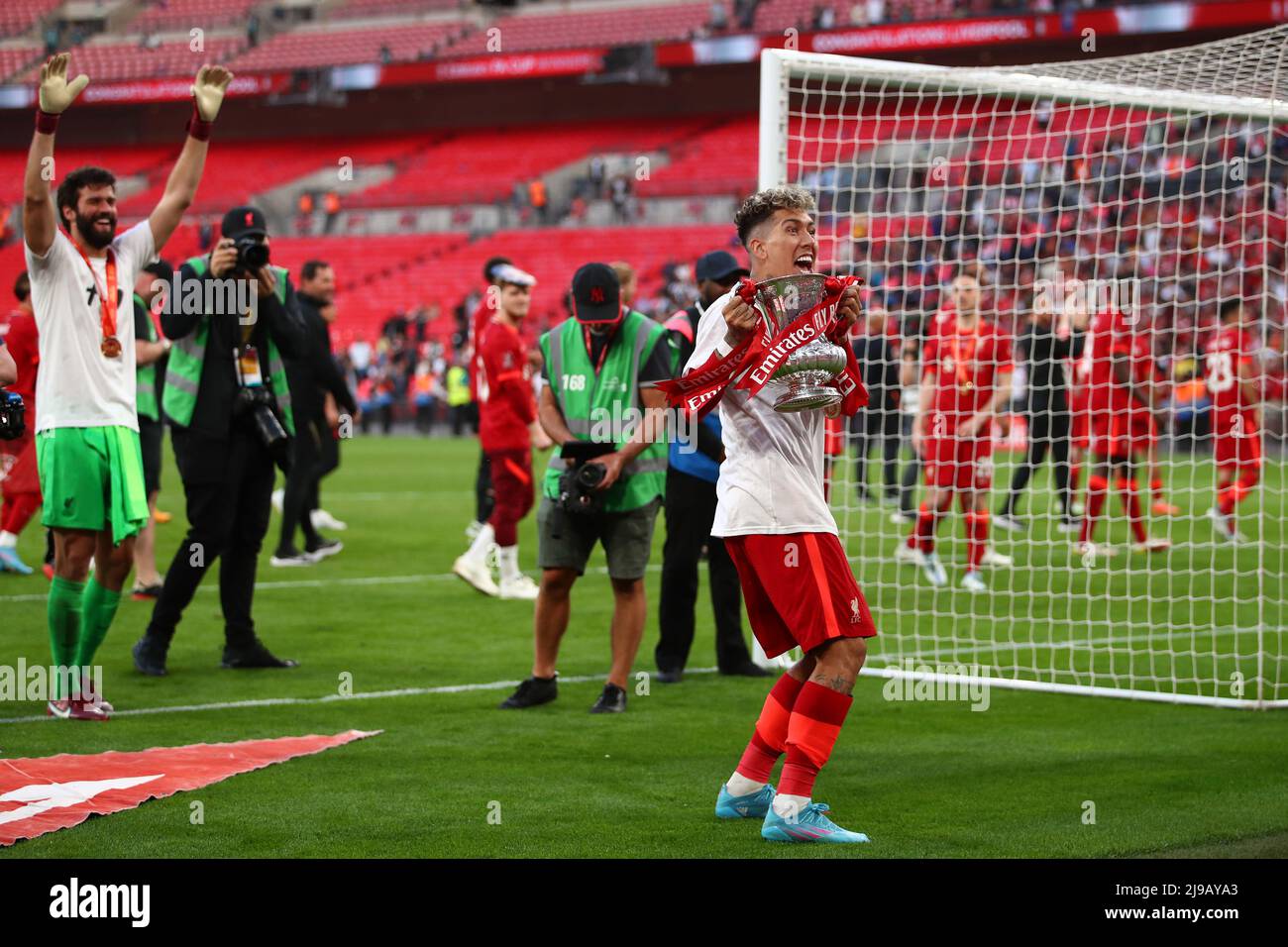 Roberto Firmino of Liverpool celebrates with the FA Cup Trophy ...