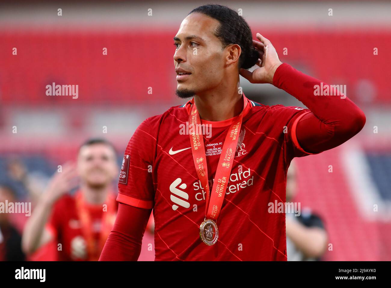 Virgil van Dijk of Liverpool is seen with his winners medal - Chelsea v ...