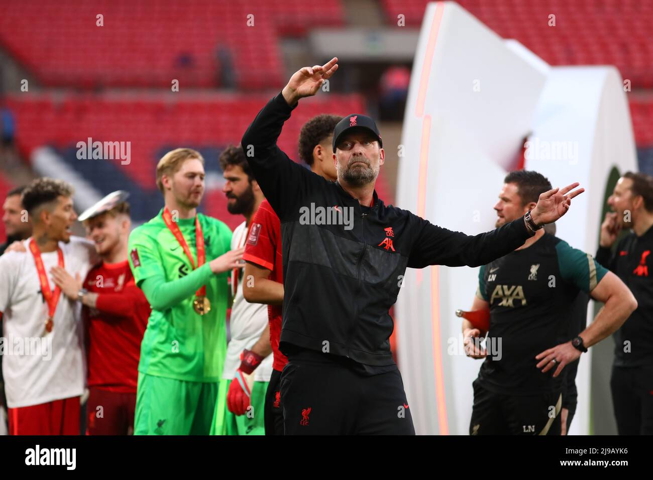 Manager of Liverpool, Jurgen Klopp dances in celebration towards the ...