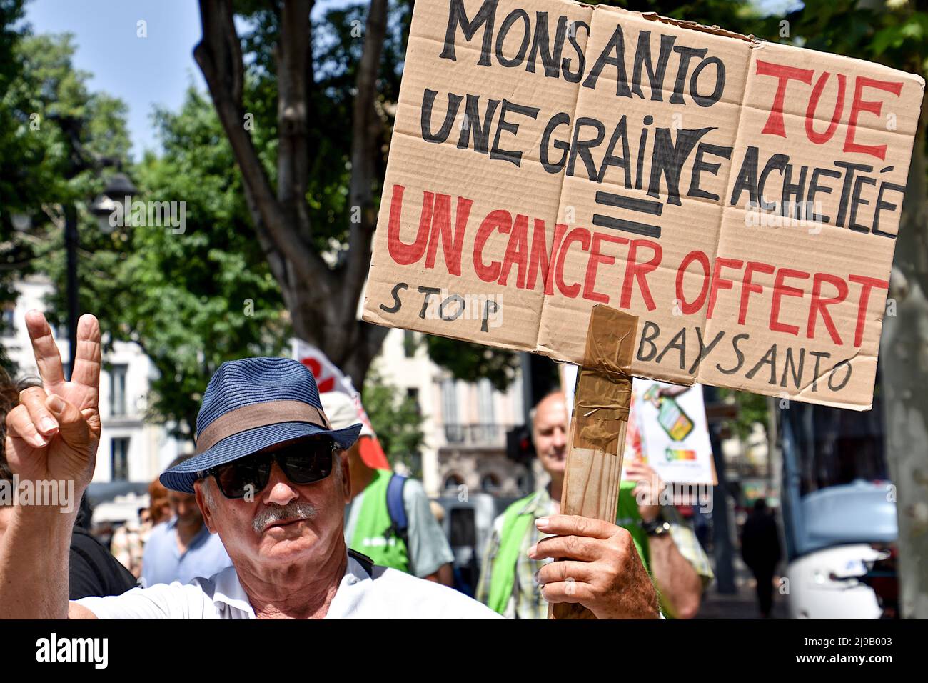 A protester holds a placard expressing his opinion during the ...
