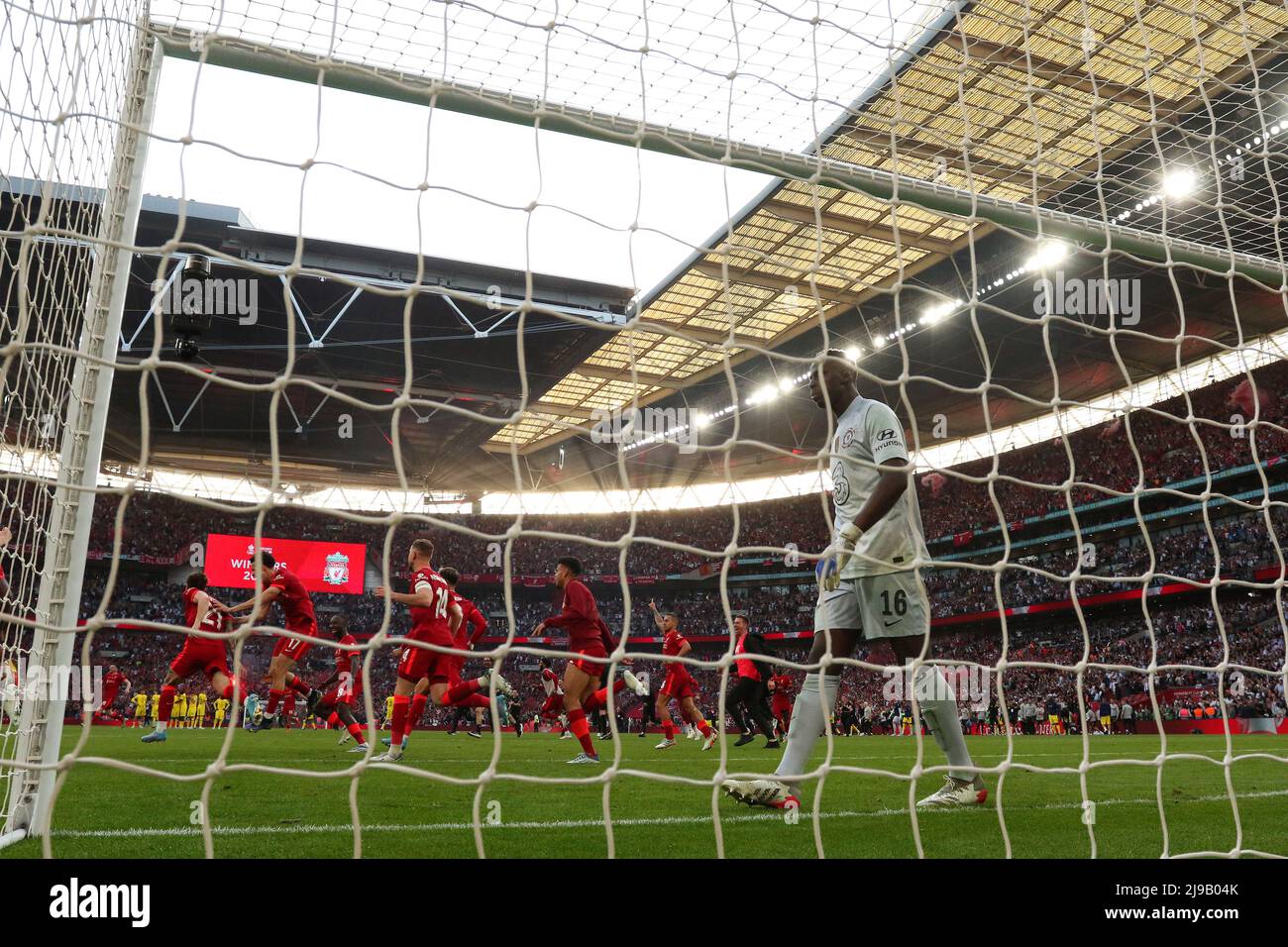 Edouard Mendy of Chelsea looks on after Kostas Tsimikas of Liverpool ...